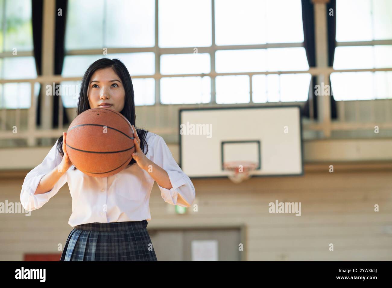 High school girls playing basketball Stock Photo - Alamy
