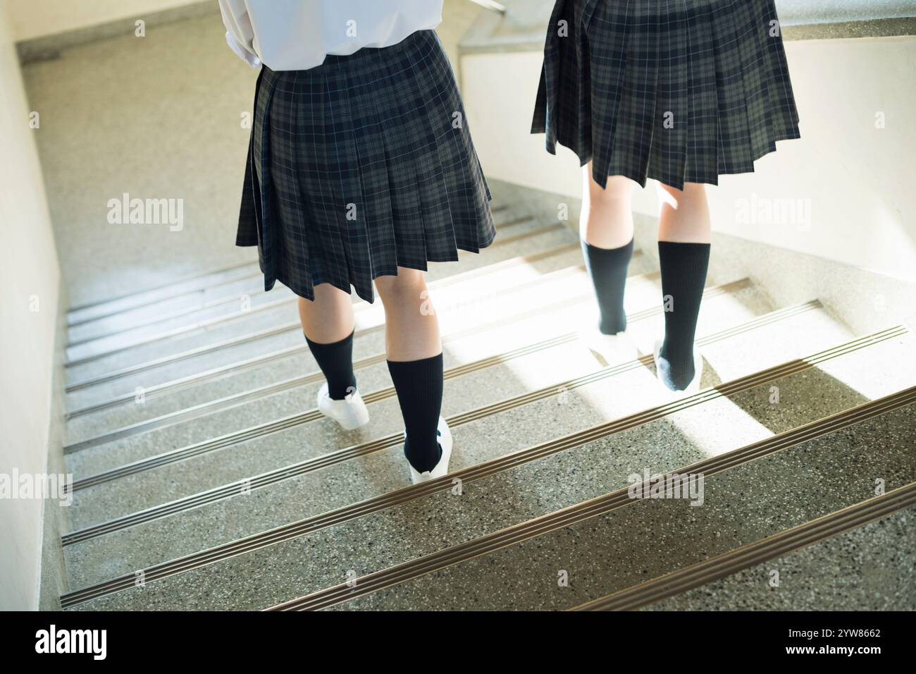 High school girl's feet going down the stairs Stock Photo - Alamy