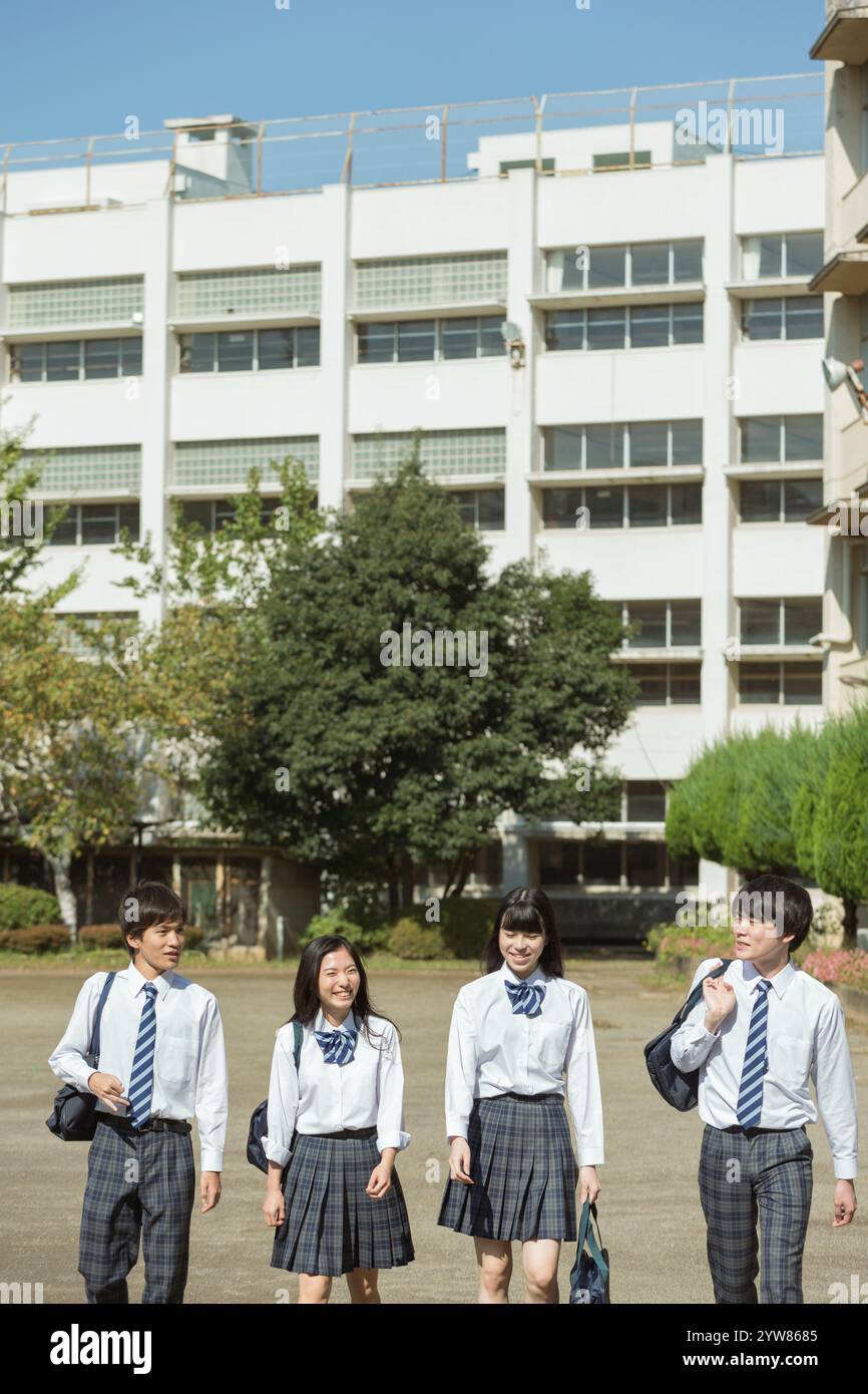 High school students leaving school Stock Photo - Alamy