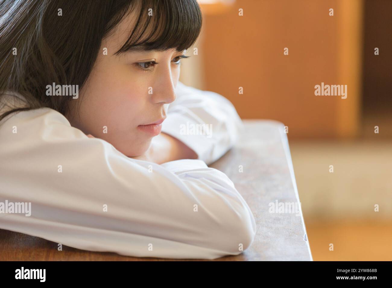 High school girl thinking Stock Photo - Alamy