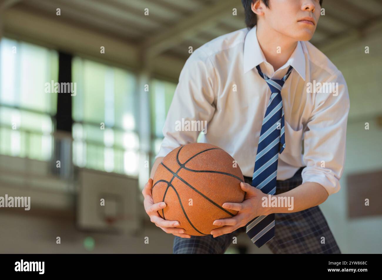 High school boys playing basketball Stock Photo - Alamy
