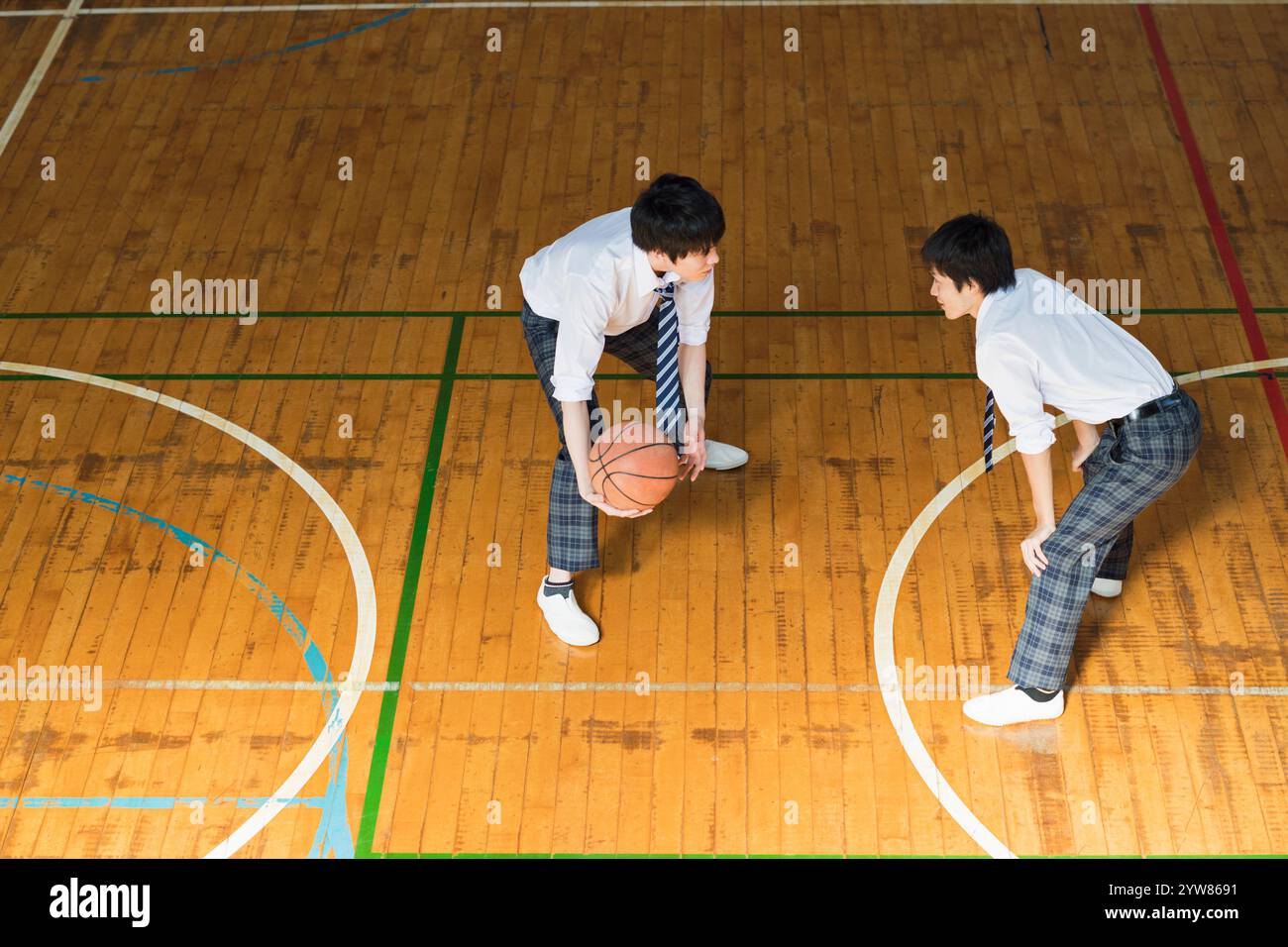 High school boys playing basketball Stock Photo - Alamy