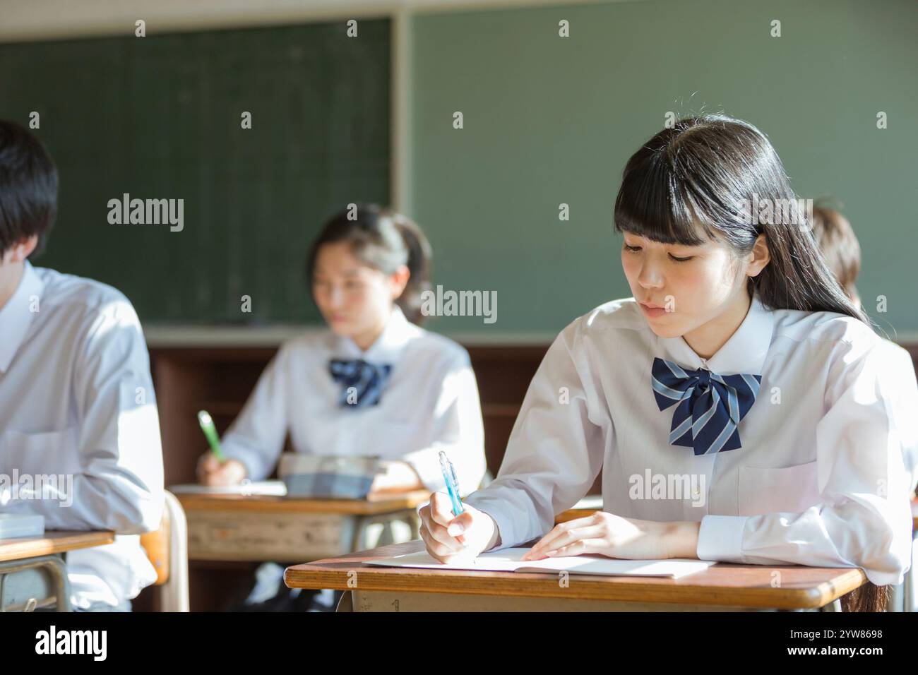 High school students studying in classroom Stock Photo - Alamy
