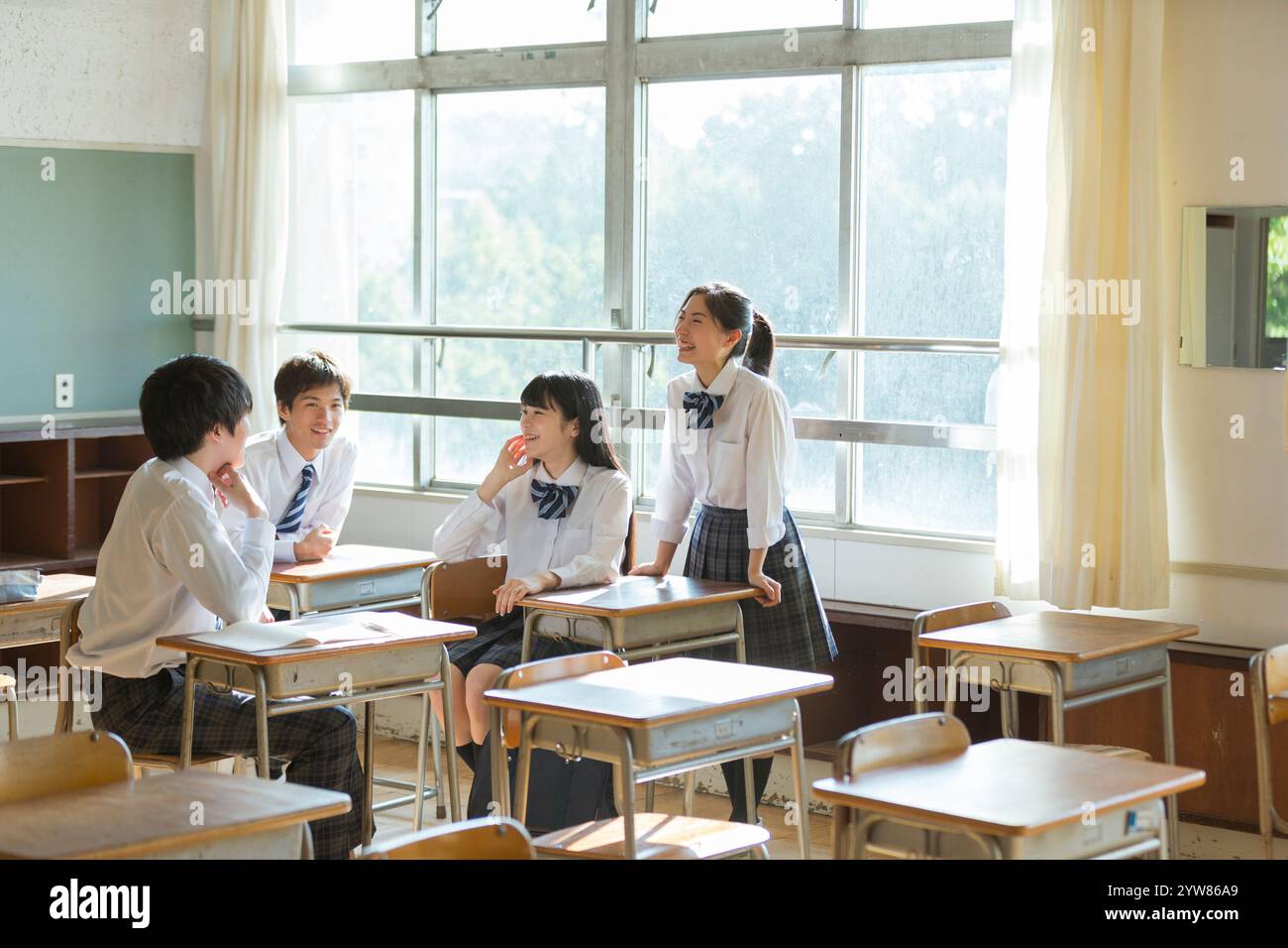 High school students talking in classroom Stock Photo - Alamy