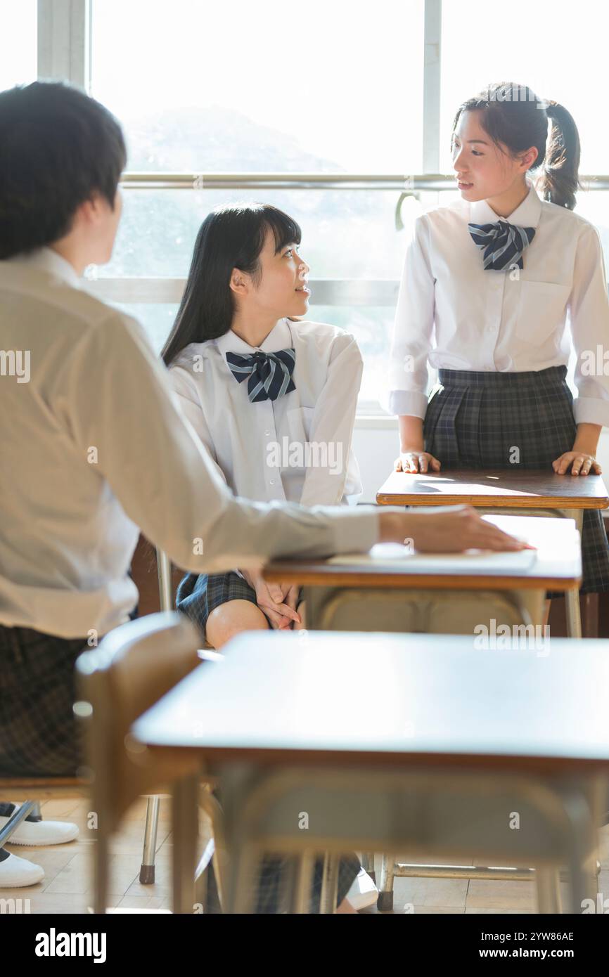 High school students talking in classroom Stock Photo - Alamy