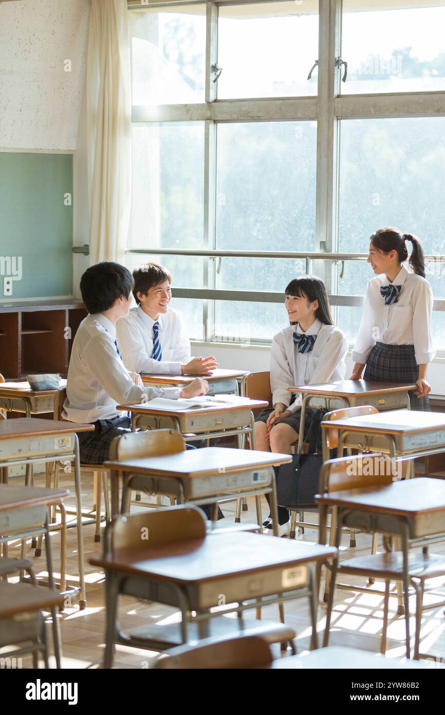 High school students talking in classroom Stock Photo - Alamy