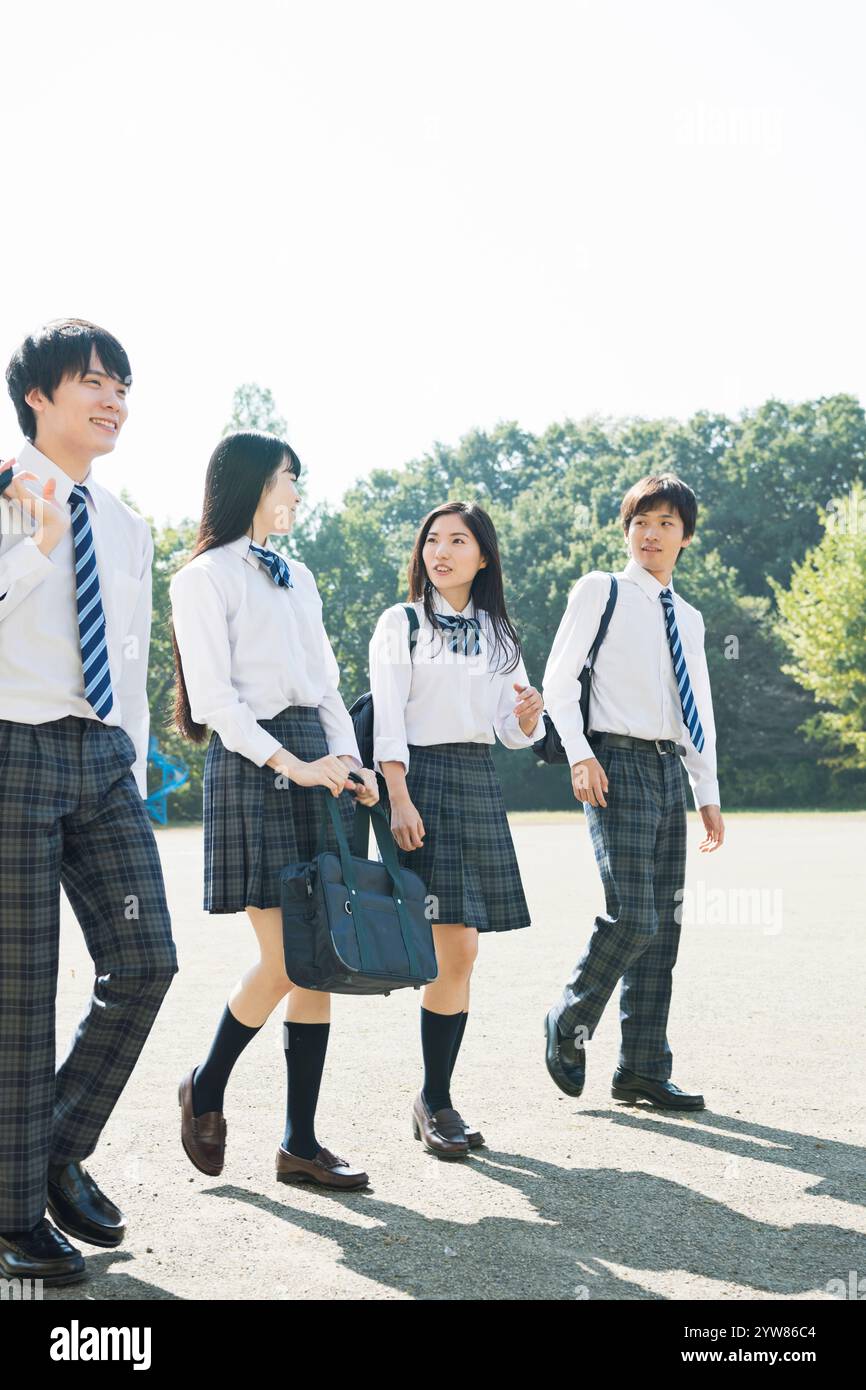 High school students on their way to school Stock Photo - Alamy