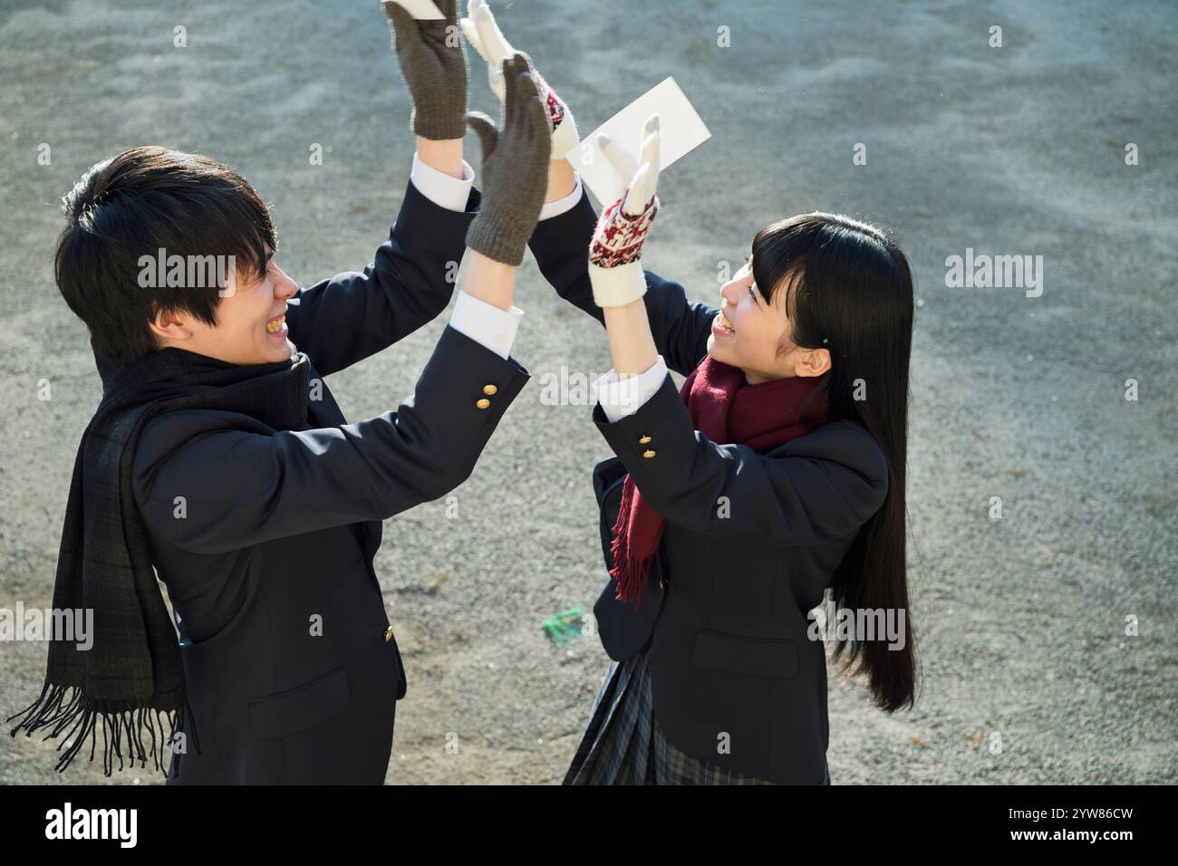 Two young successful happy students hi-res stock photography and images ...
