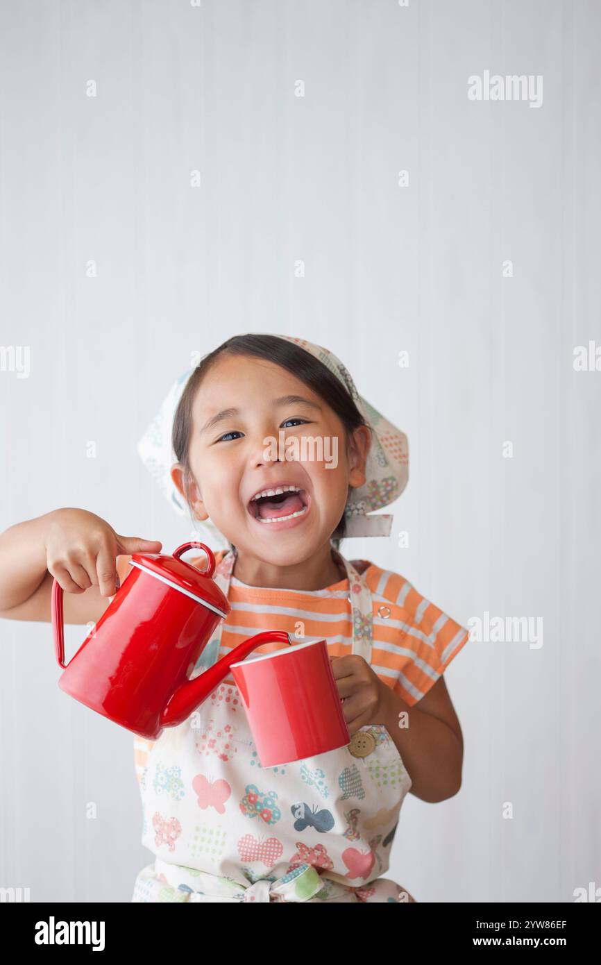 Girl pouring drink hi-res stock photography and images - Alamy
