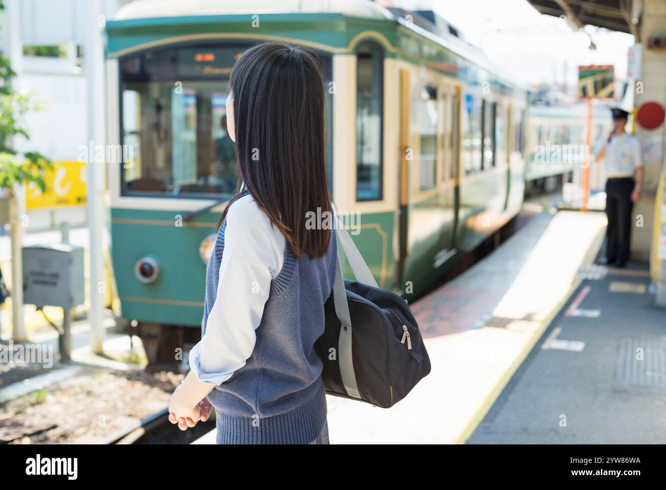 High school girls Going to school by train Stock Photo - Alamy
