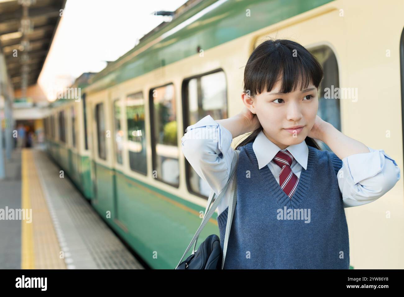 High school girls Going to school by train Stock Photo - Alamy