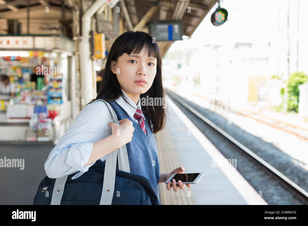 High school girls Going to school by train Stock Photo - Alamy