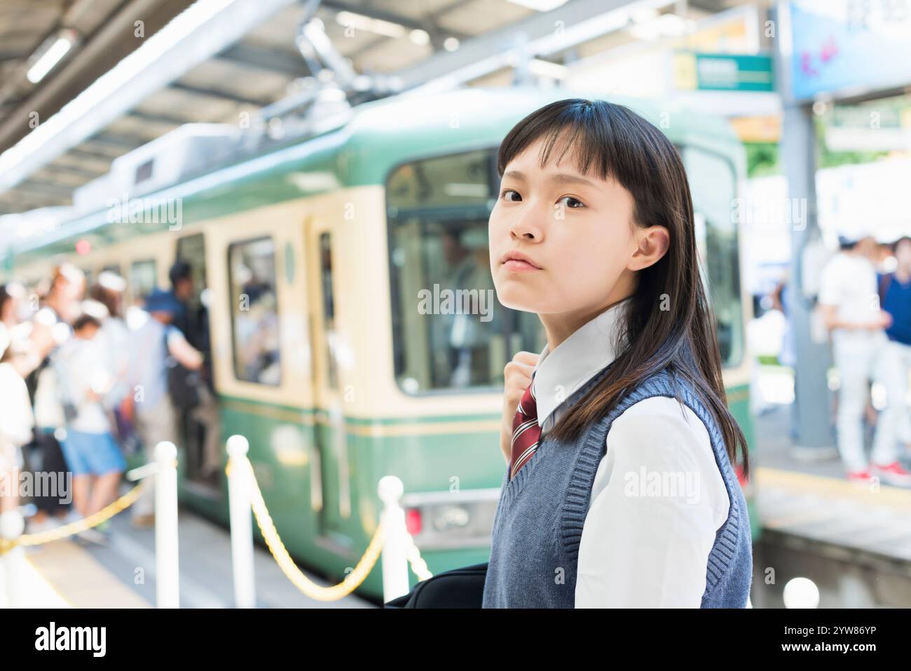 High school girls Going to school by train Stock Photo - Alamy
