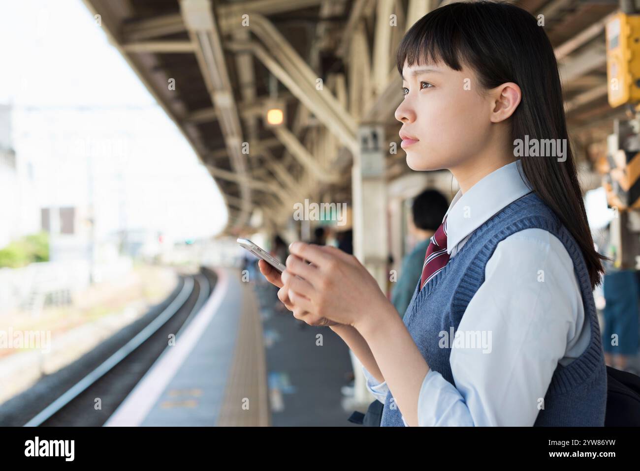 High school girls Going to school by train Stock Photo - Alamy