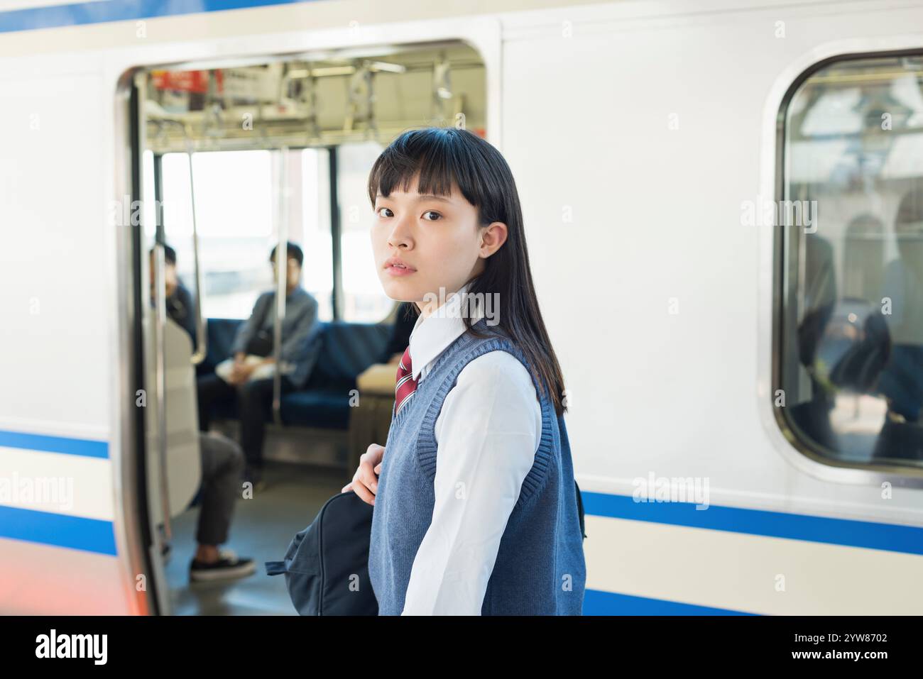 High school girls Going to school by train Stock Photo - Alamy