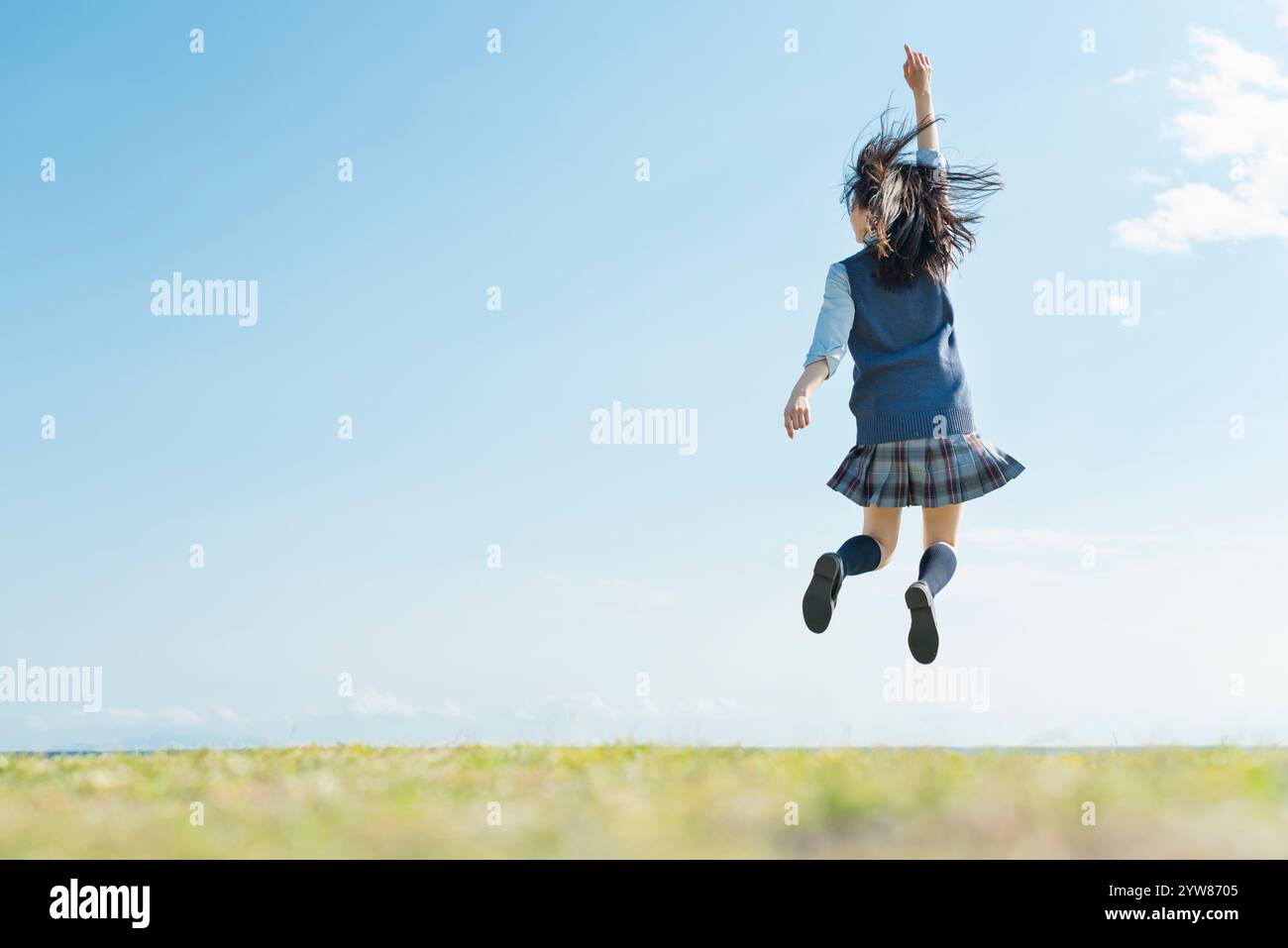 High school girls Sea Meadow Jumping Stock Photo - Alamy