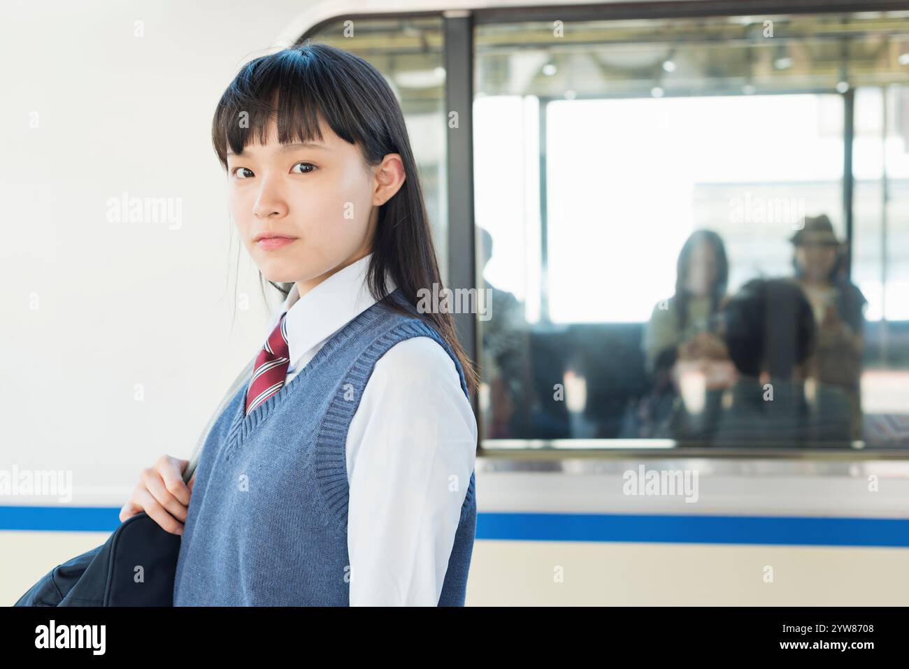High school girls Going to school by train Stock Photo - Alamy