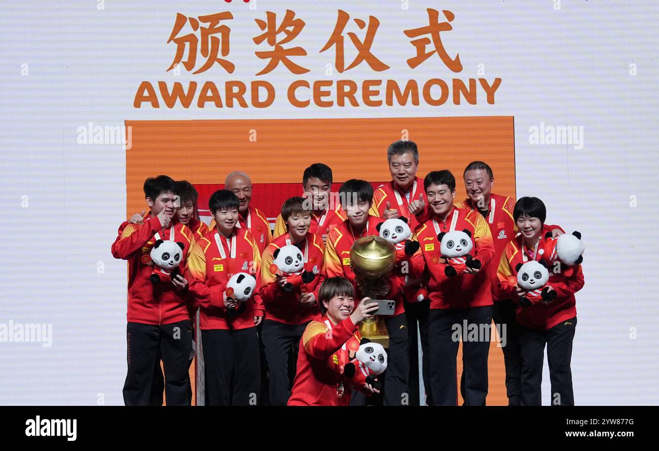 Team China pose on the podium during the awarding ceremony after the ...