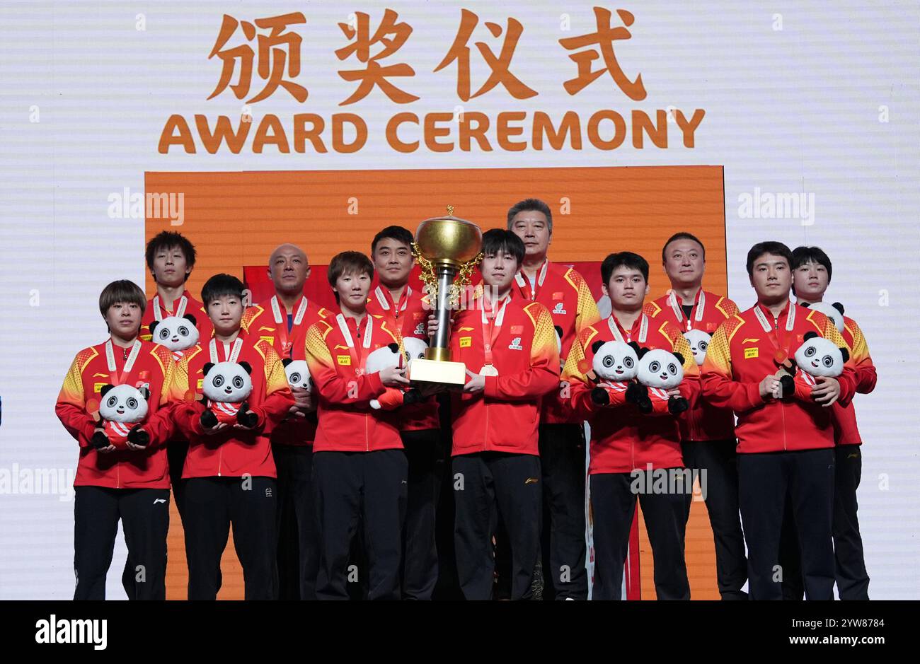 Team China pose on the podium during the awarding ceremony after the ...