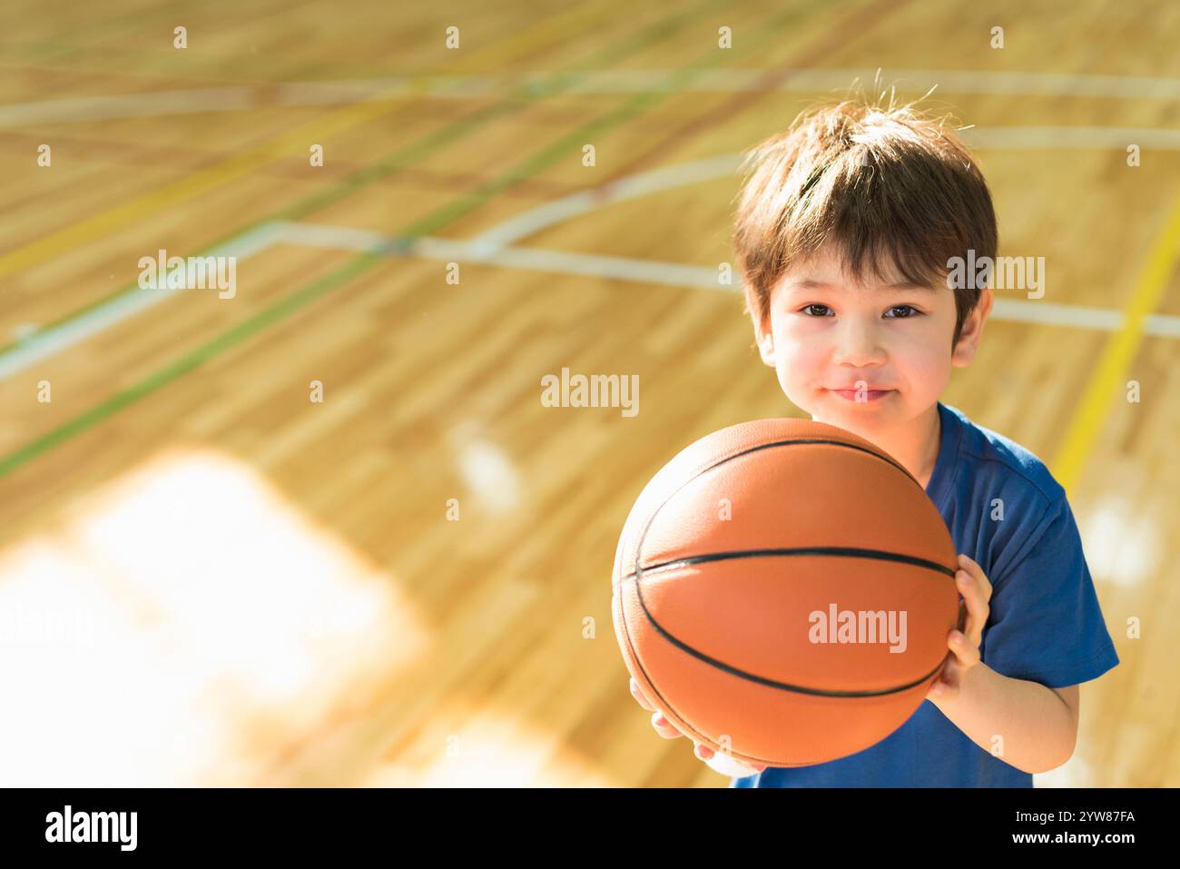 Indoor child basketball hi-res stock photography and images - Alamy