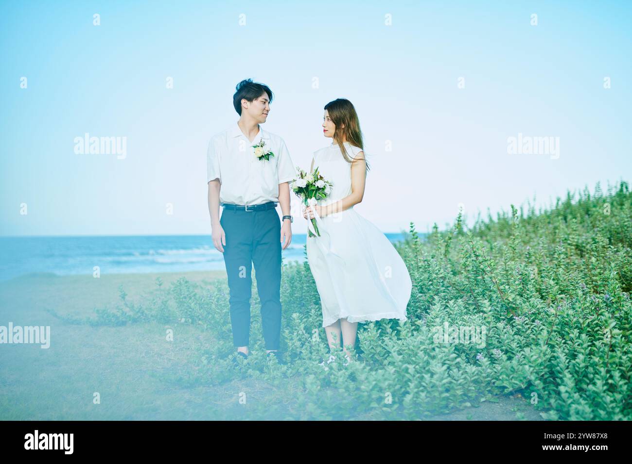 Wedding Couple Staring at Each Other Stock Photo - Alamy