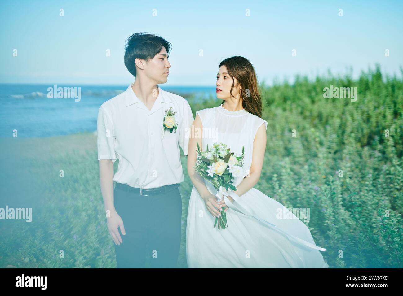 Wedding Couple Staring at Each Other Stock Photo - Alamy