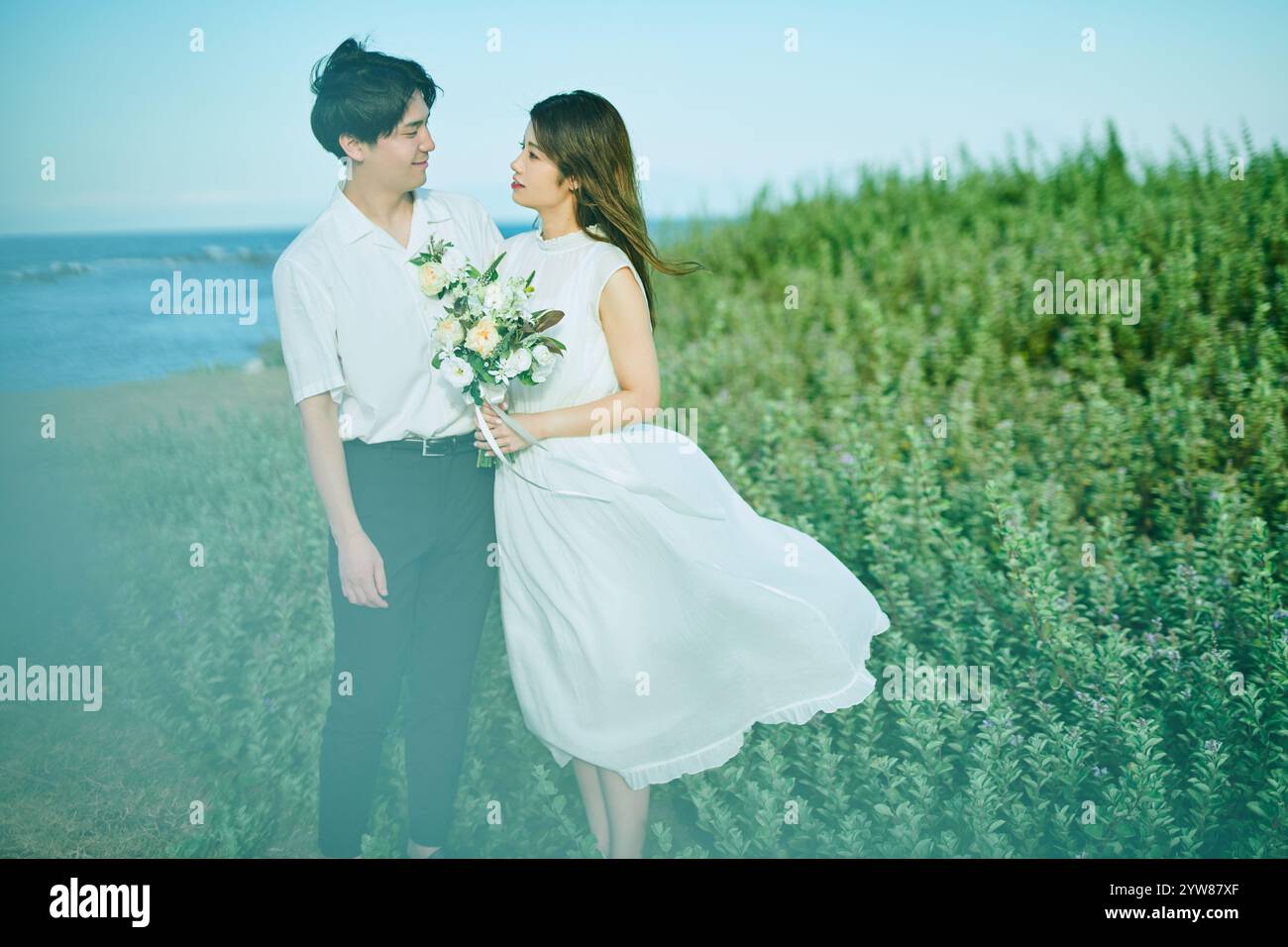 Wedding Couple Staring at Each Other Stock Photo - Alamy