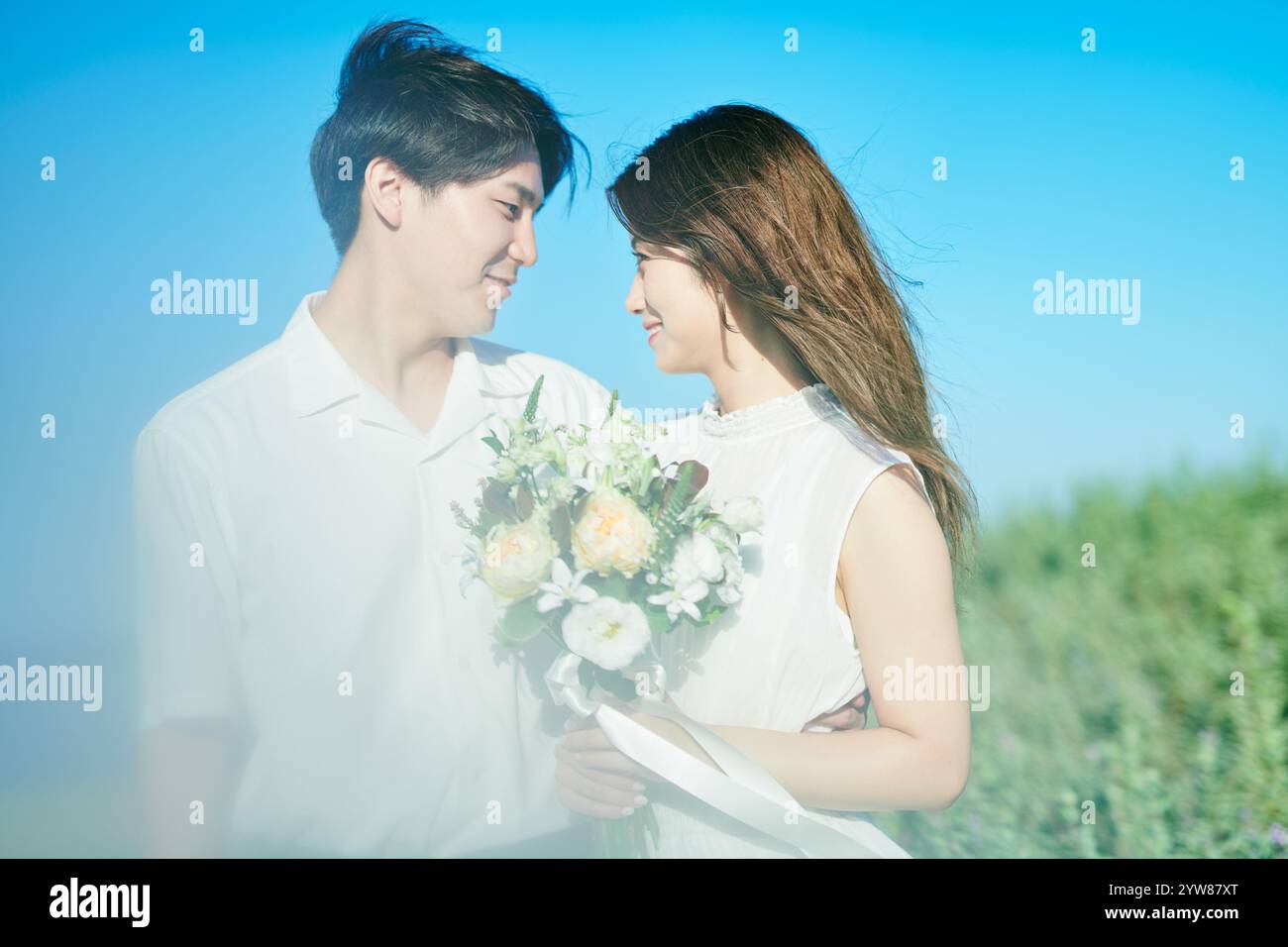 Wedding Couple Staring at Each Other Stock Photo - Alamy
