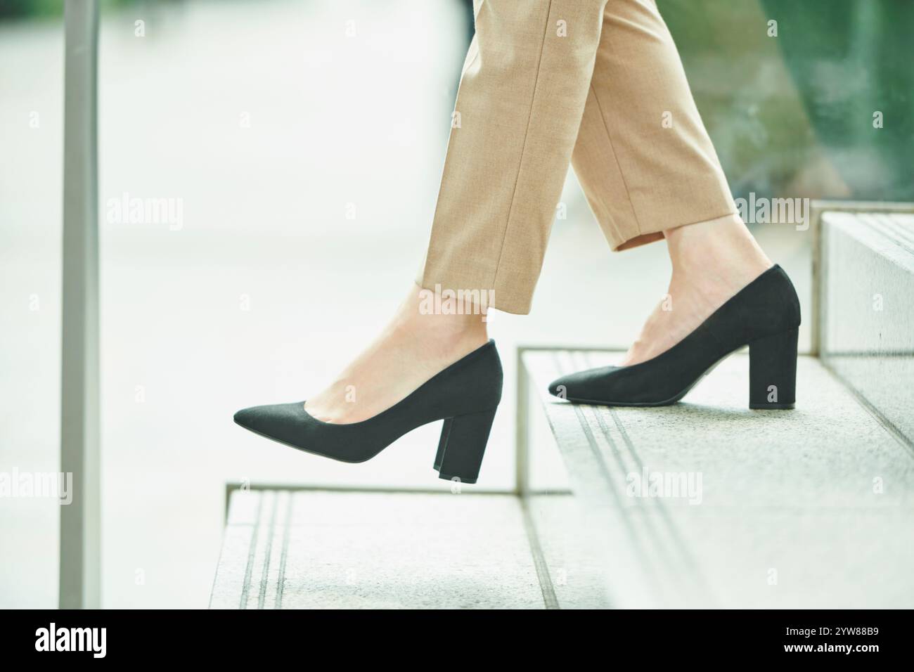 Business people going up stairs hi-res stock photography and images - Alamy