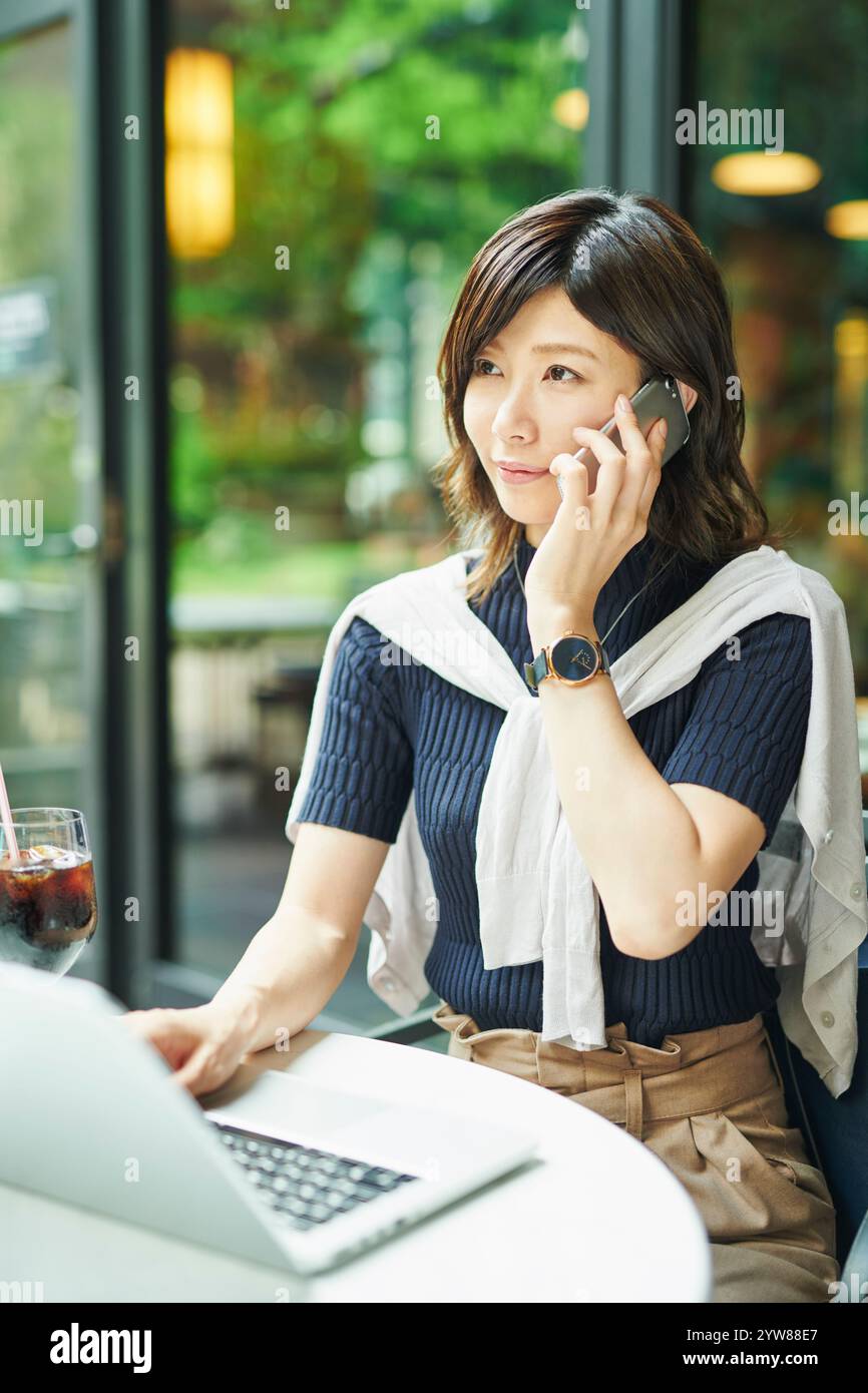 Business Woman OL Make a call Stock Photo - Alamy