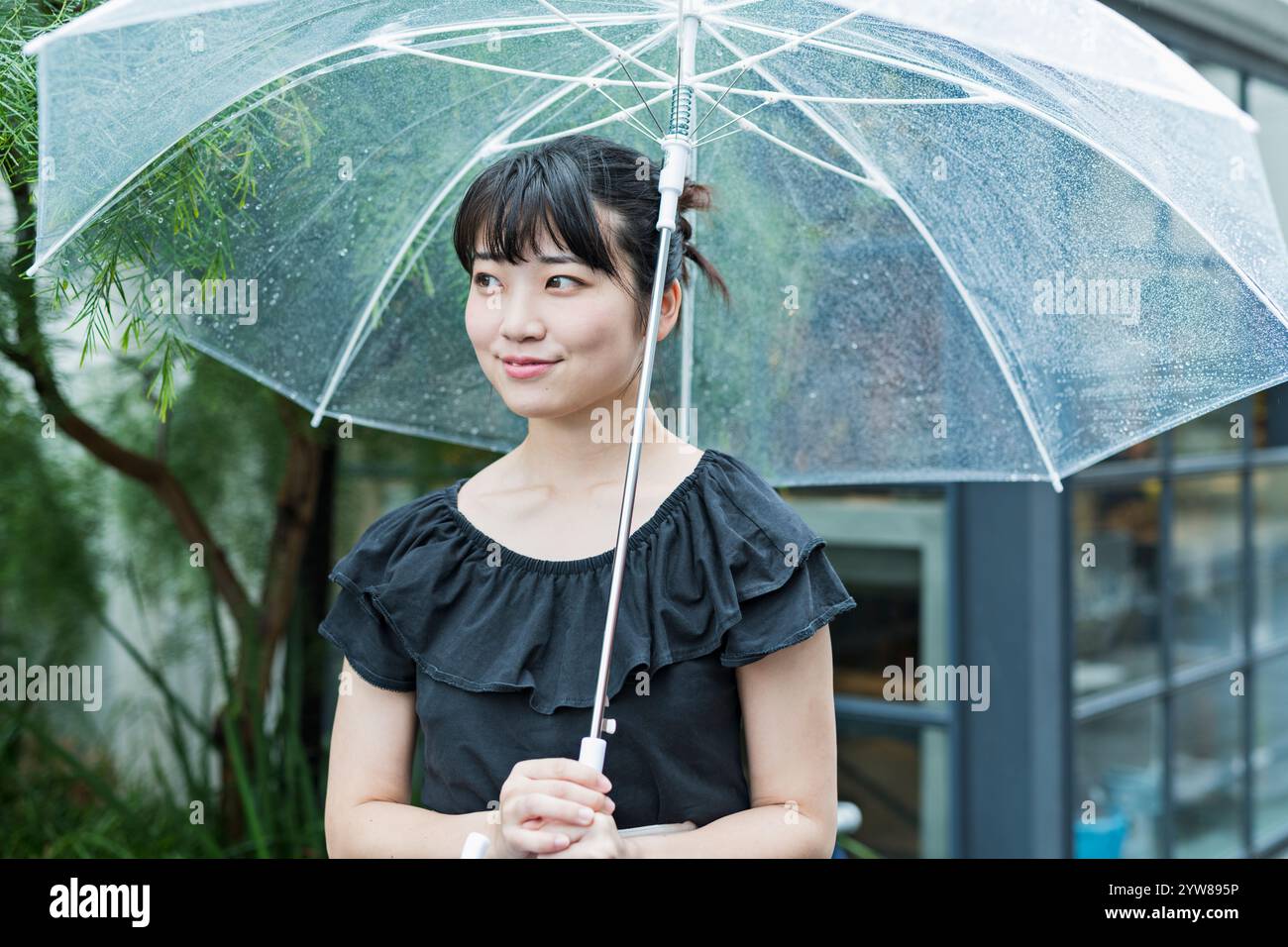 Female Rain Walking Stock Photo - Alamy