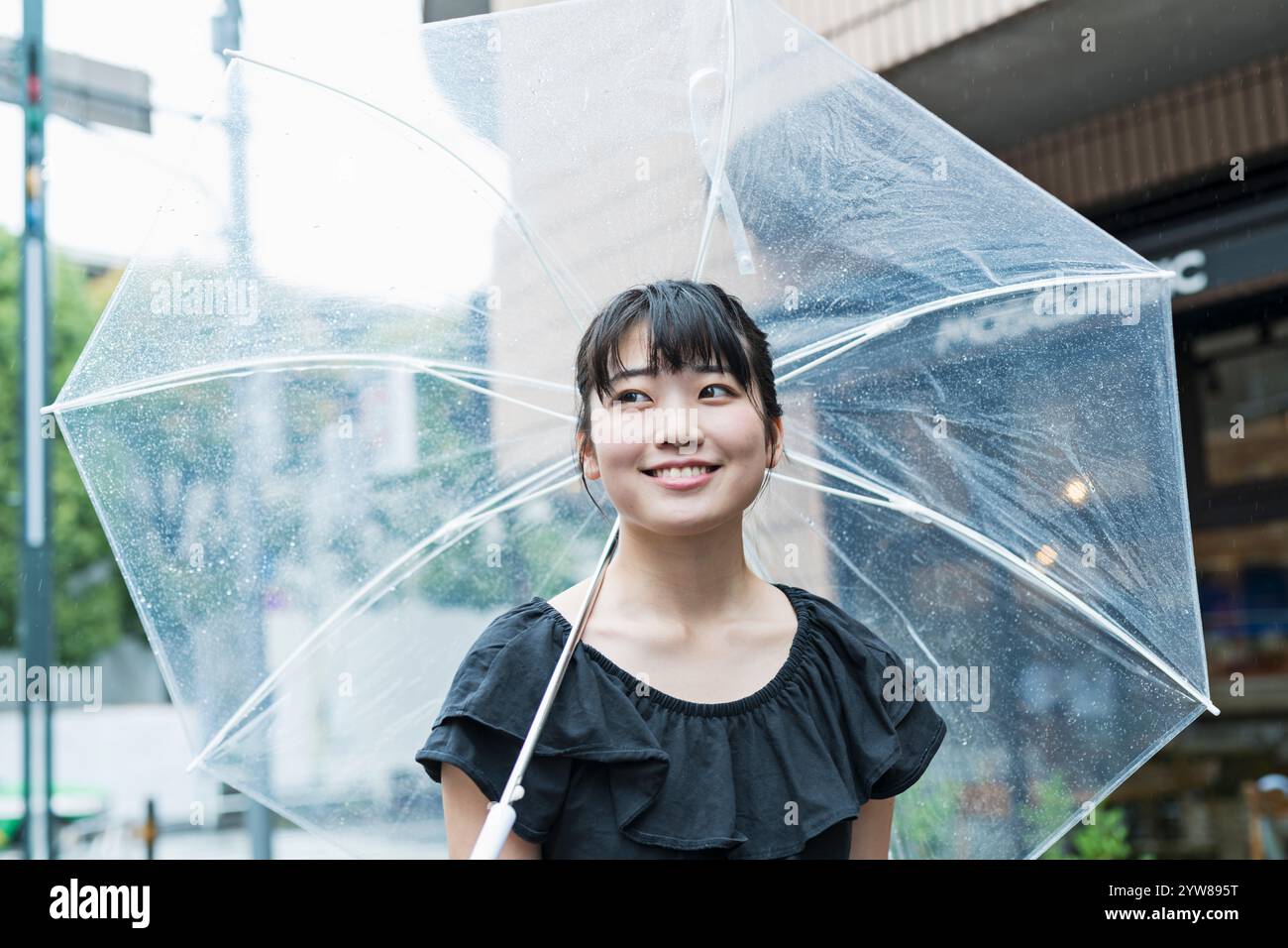 Japanese student rain hi-res stock photography and images - Alamy
