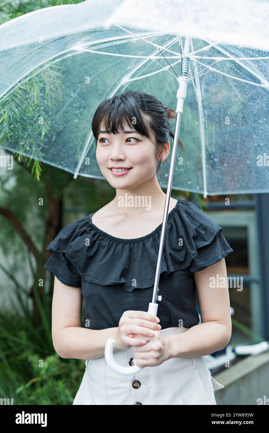 Japanese student rain hi-res stock photography and images - Alamy