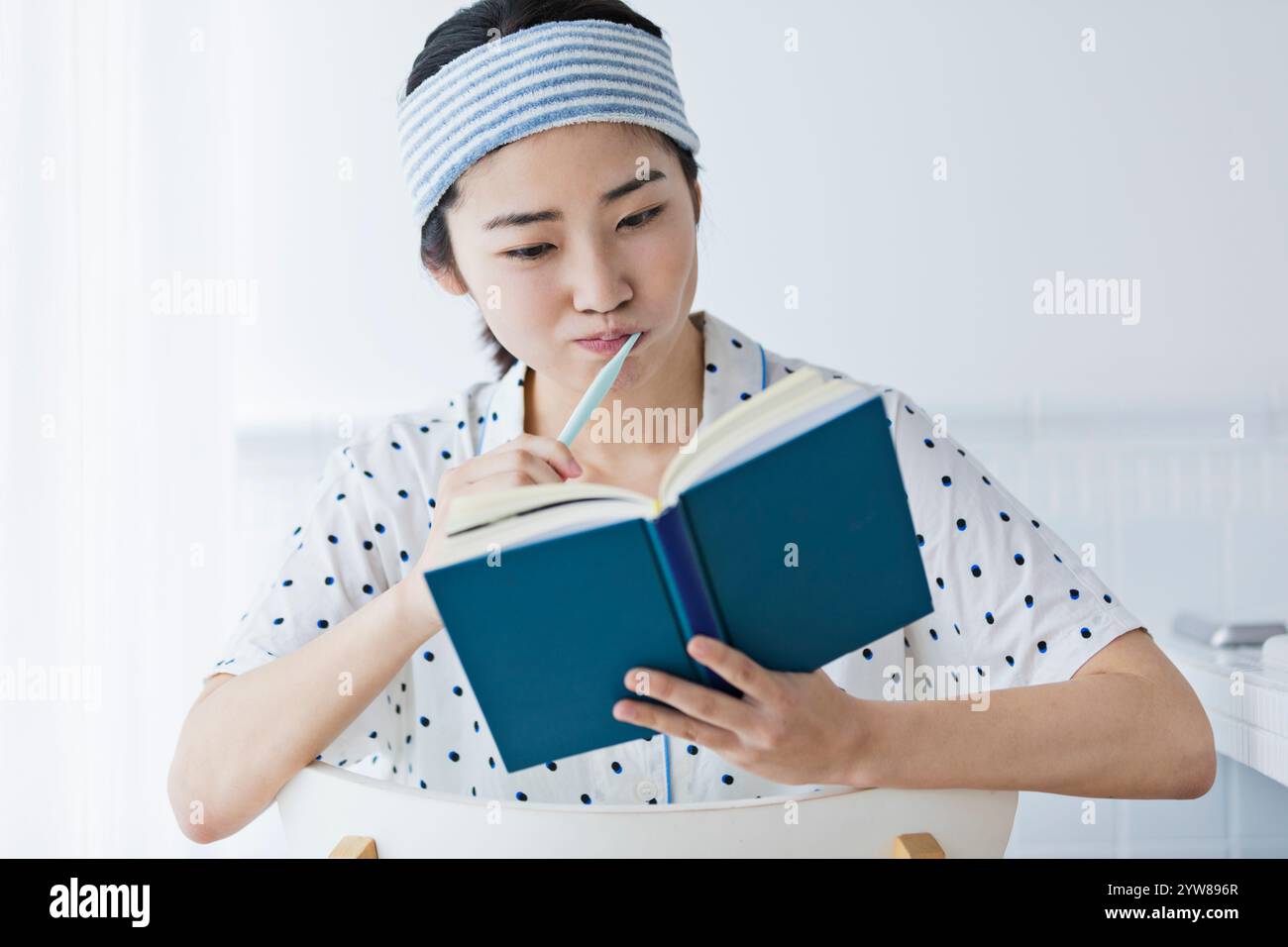 Women Teeth brushing Reading Stock Photo - Alamy