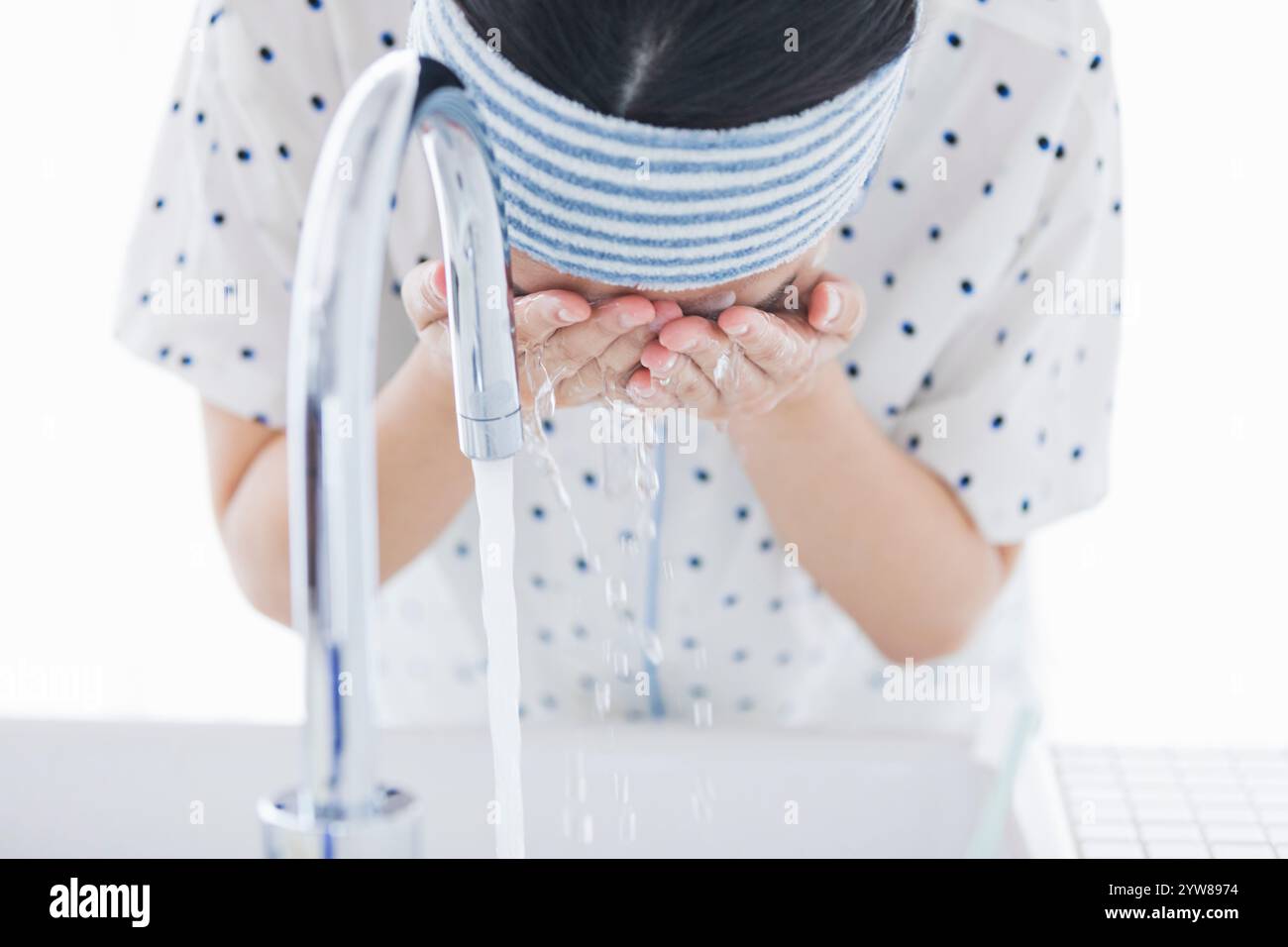 Women Washing face Stock Photo - Alamy