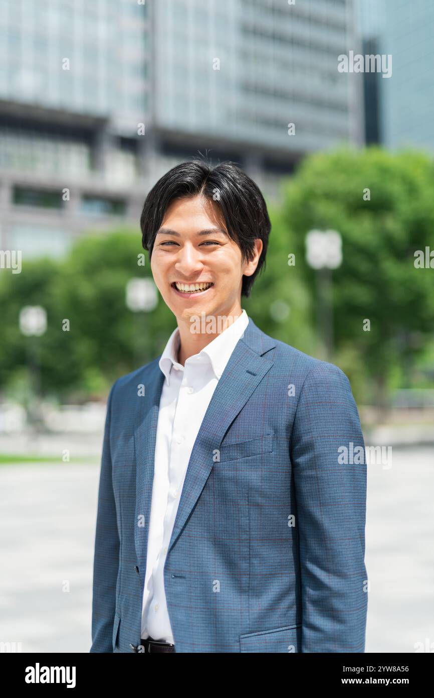Asian businessman portrait building hi-res stock photography and images ...
