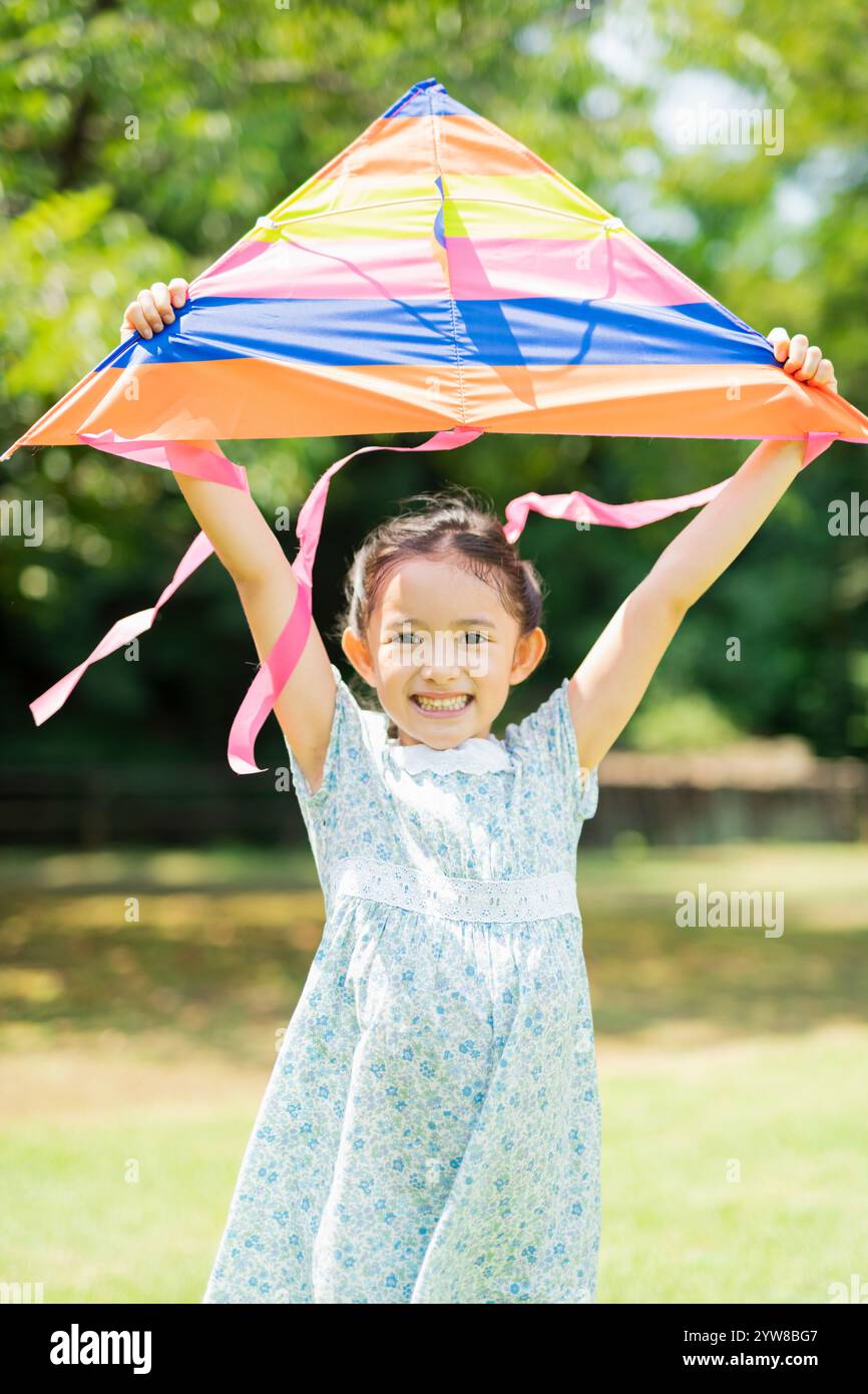 Girl playing with octopus Stock Photo - Alamy