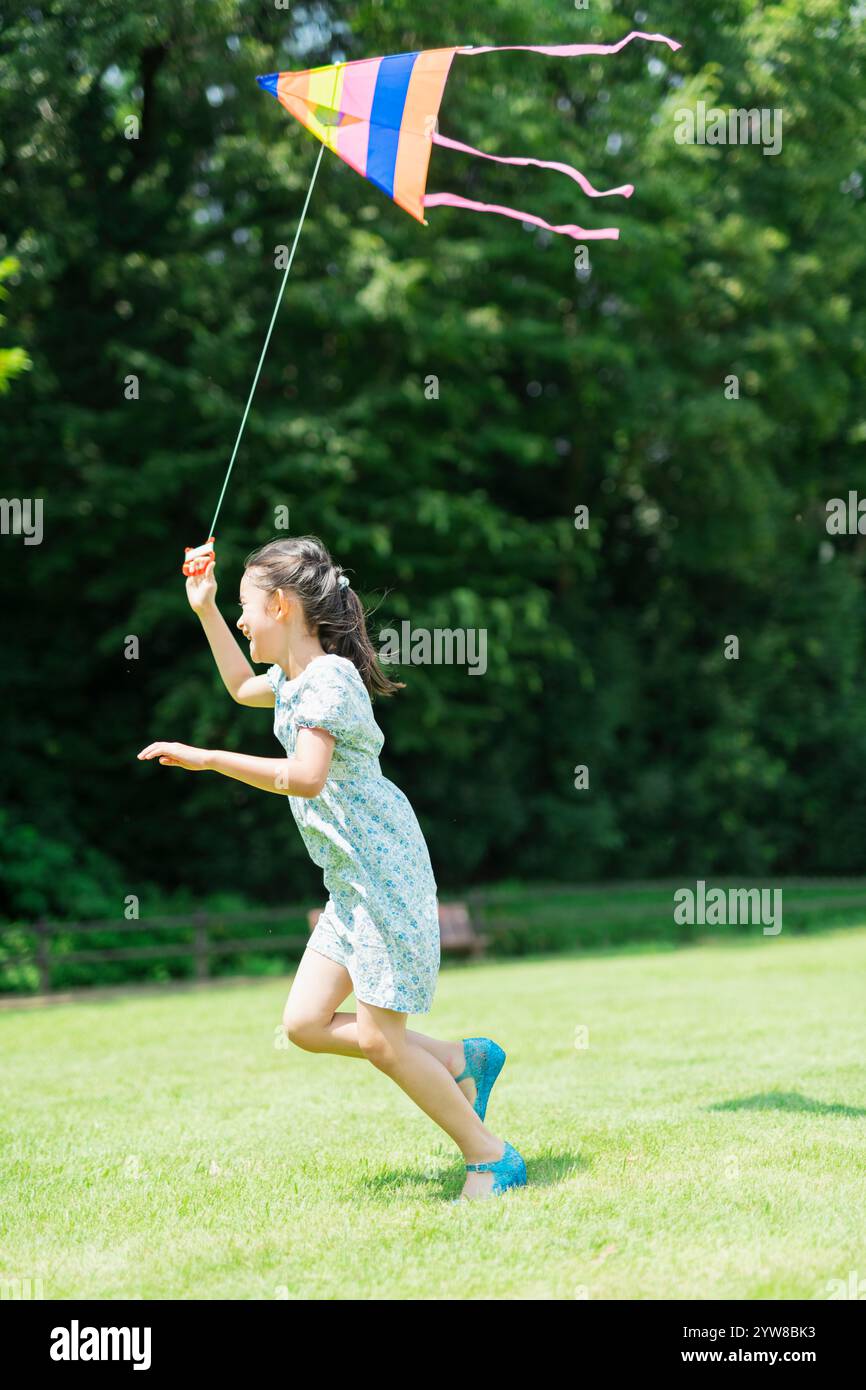 Girl playing with octopus Stock Photo - Alamy