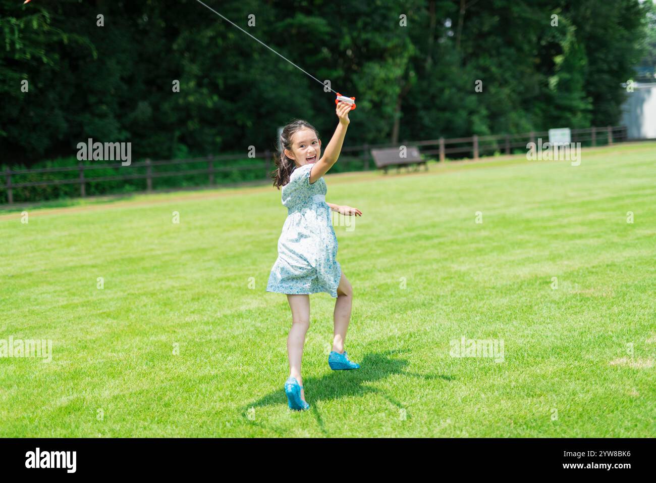 Girl playing with octopus Stock Photo - Alamy