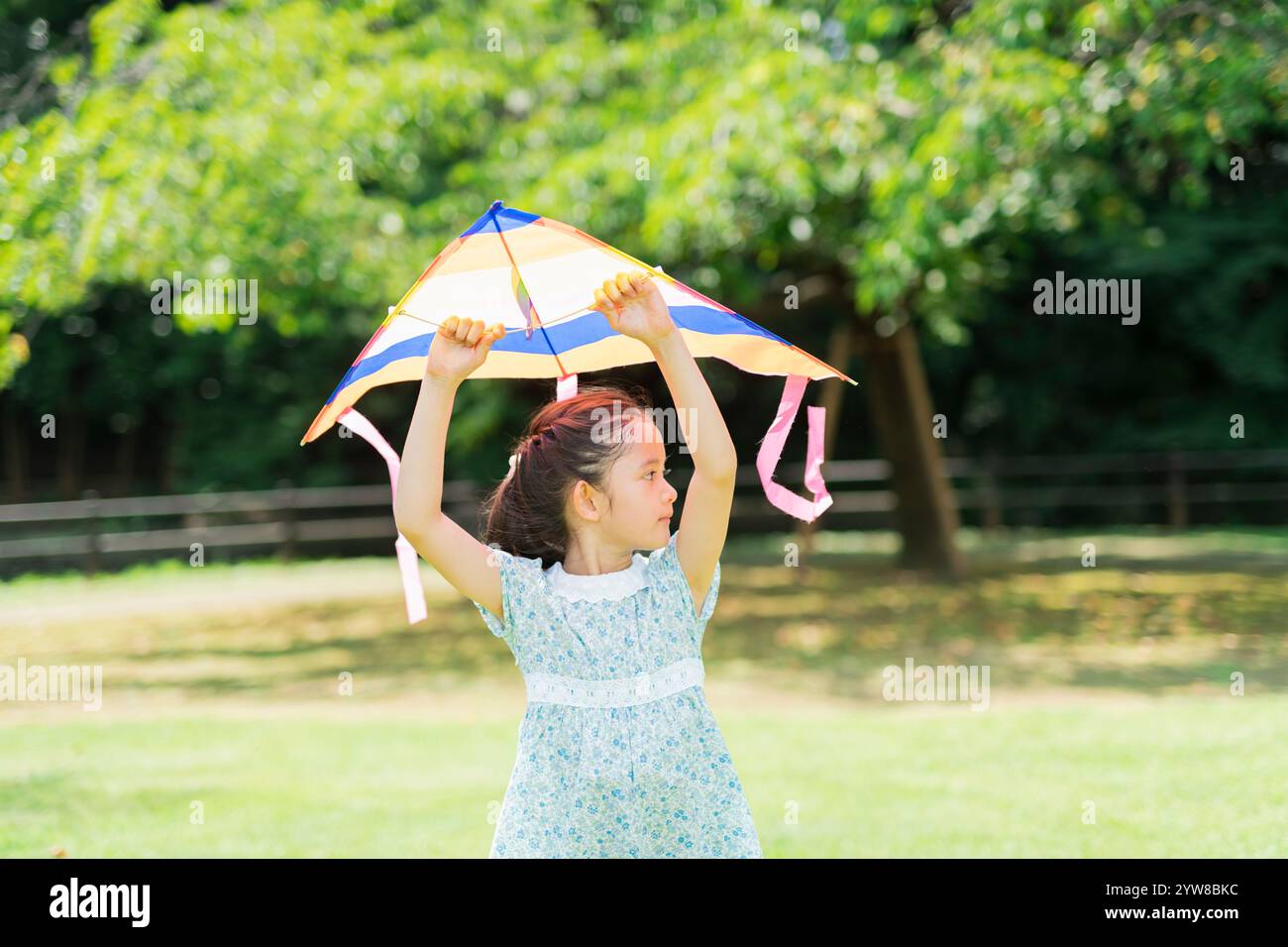 Girl playing with octopus Stock Photo - Alamy