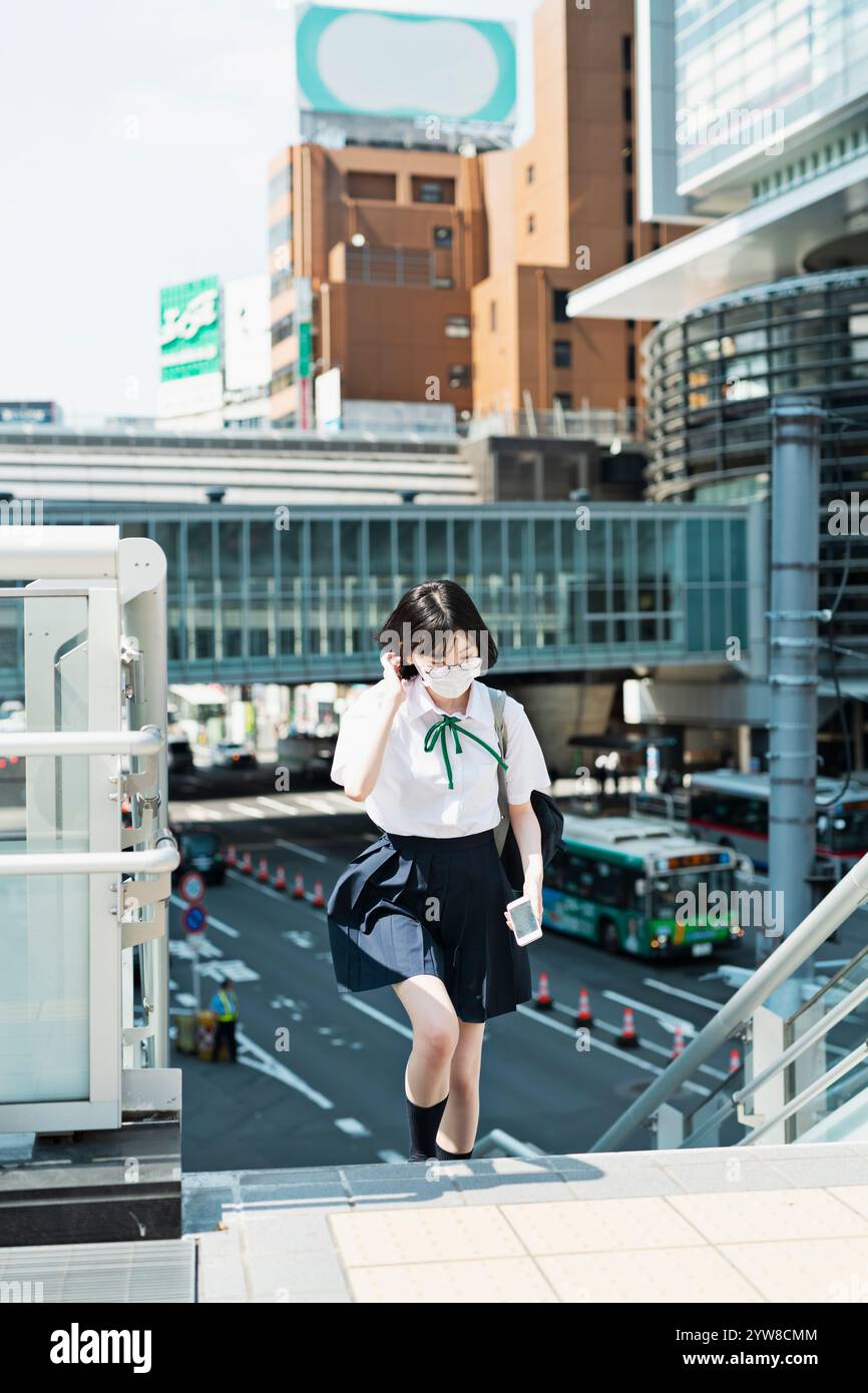 High school girls walking in Shibuya Stock Photo - Alamy
