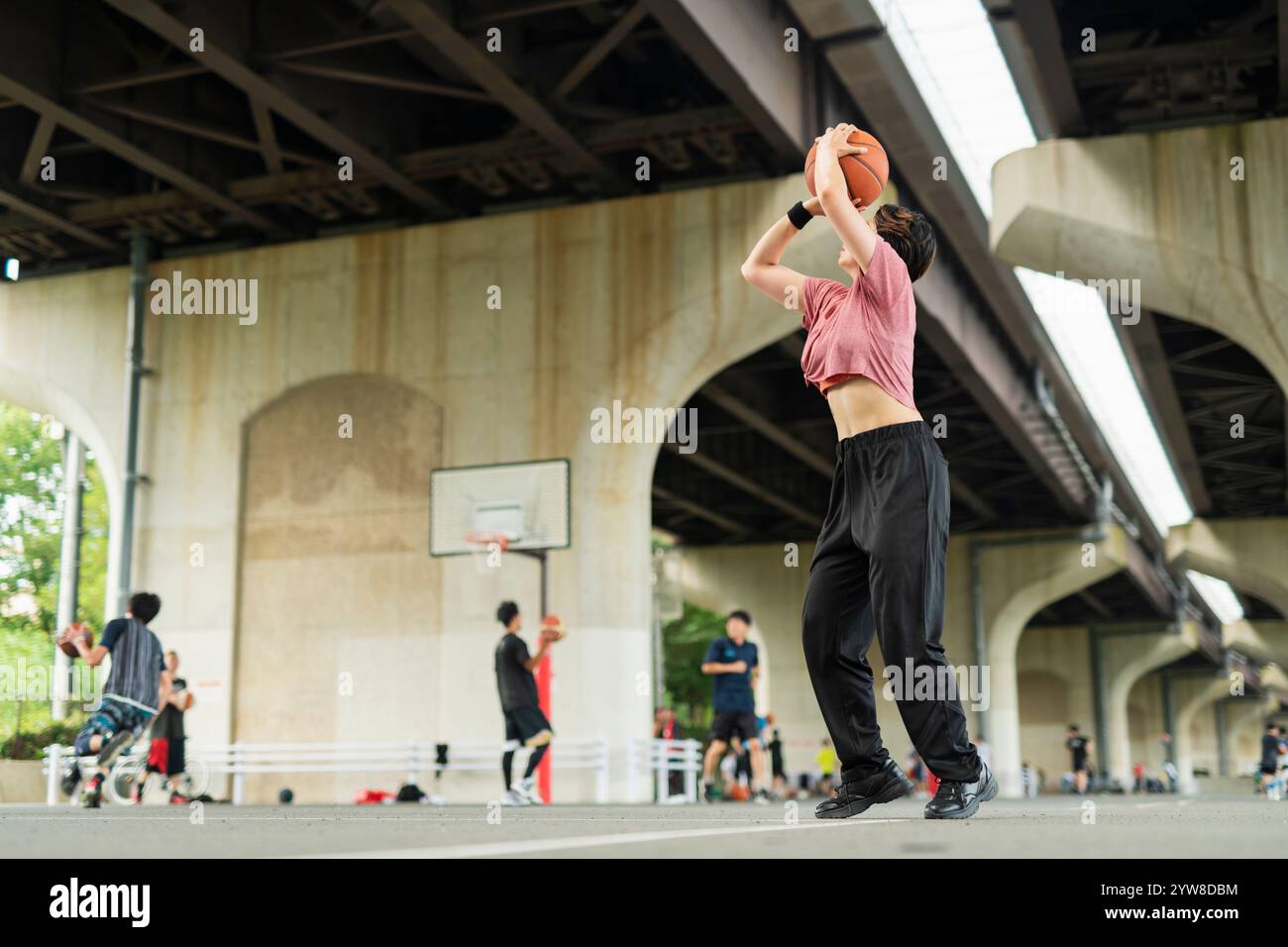 Women playing basketball Stock Photo - Alamy