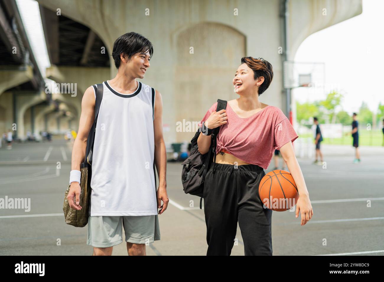 Moving basketball men and women Stock Photo - Alamy