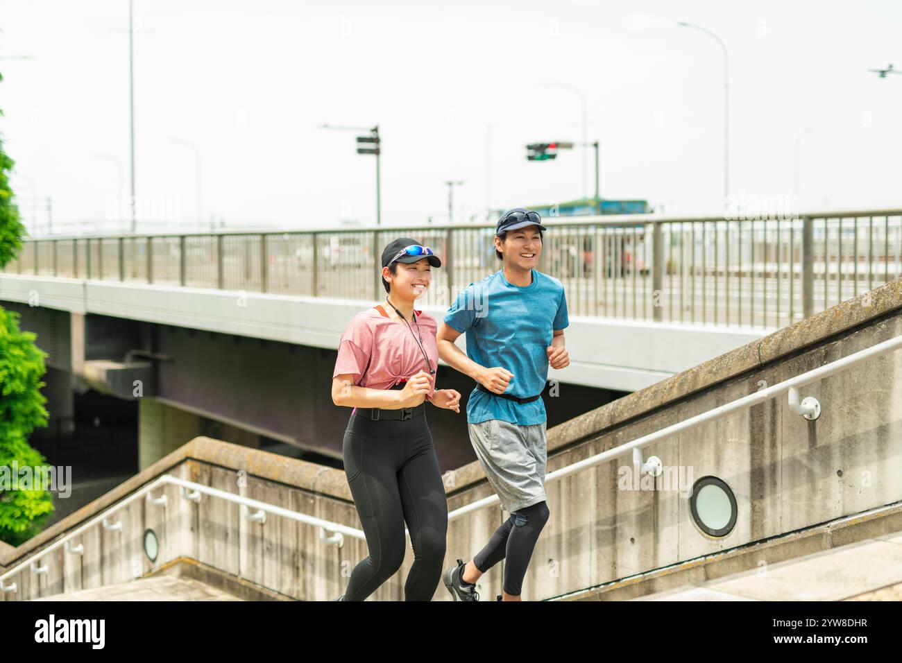 Two women running up stairs hi-res stock photography and images - Alamy