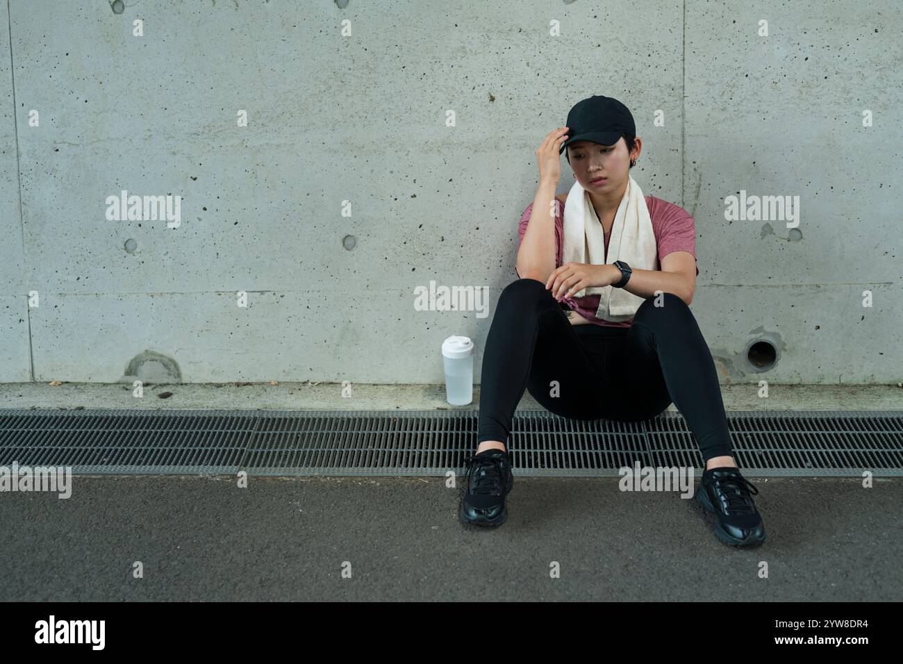 Women who fall ill during exercise Stock Photo - Alamy