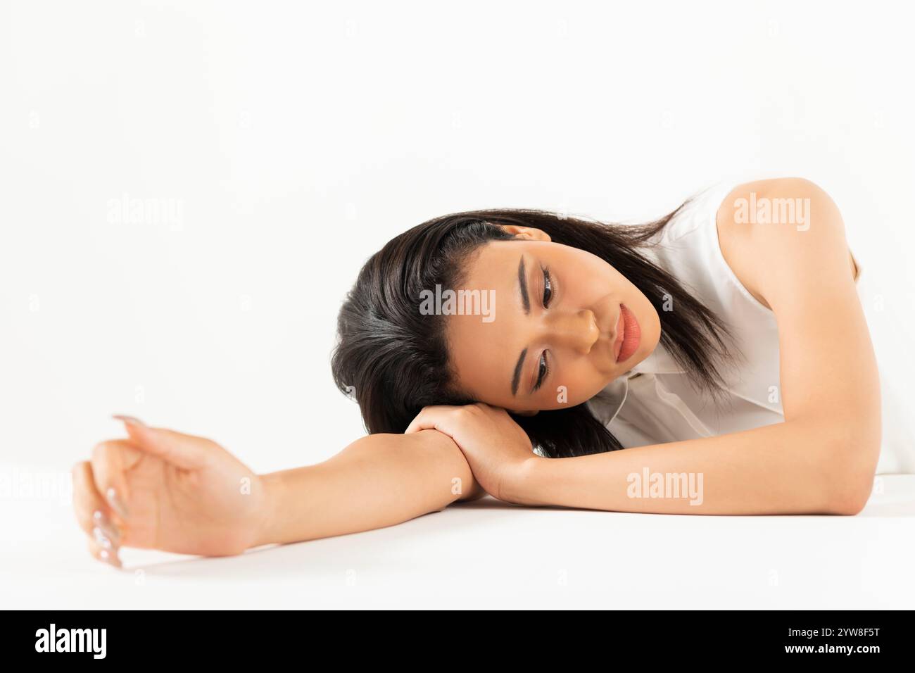 Half-woman lying on desk Stock Photo - Alamy