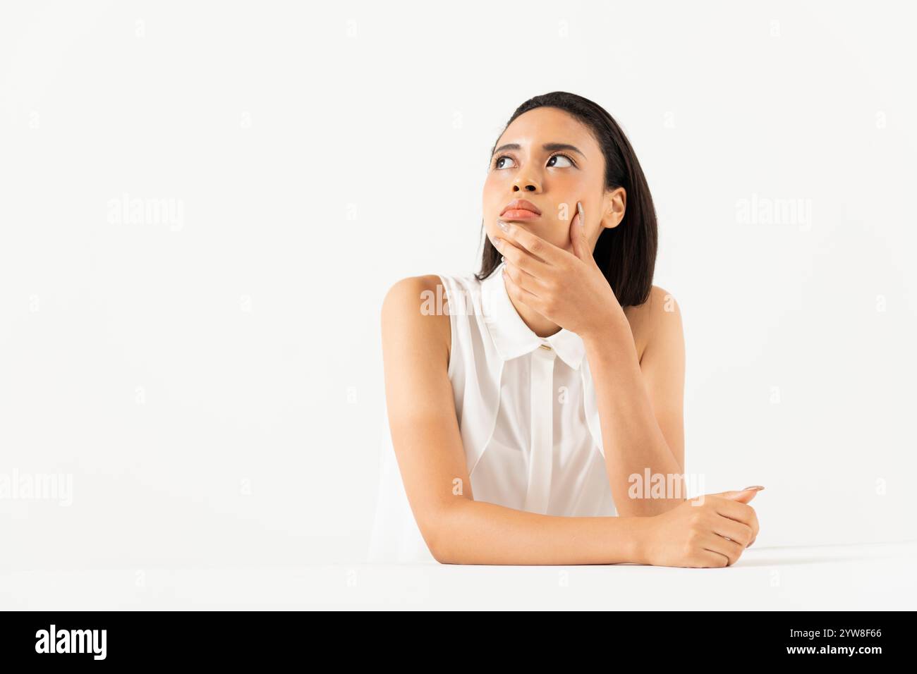 Half-woman with a melancholy look on her face Stock Photo - Alamy