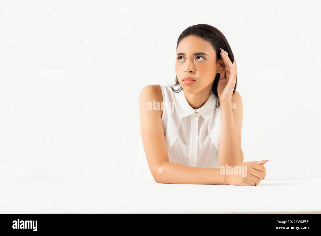 Half-woman with a melancholy look on her face Stock Photo - Alamy