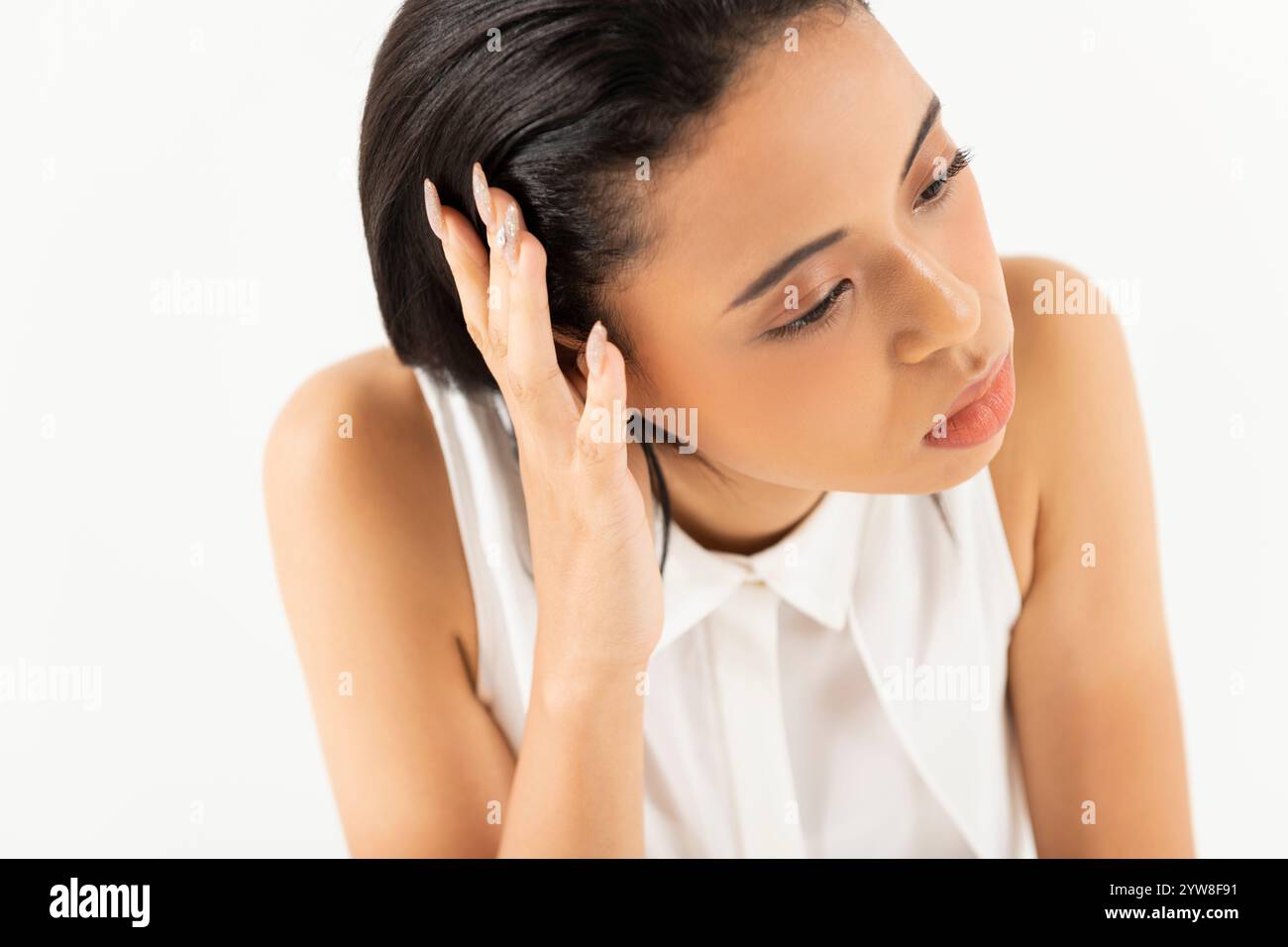 Half-woman with a melancholy look on her face Stock Photo - Alamy