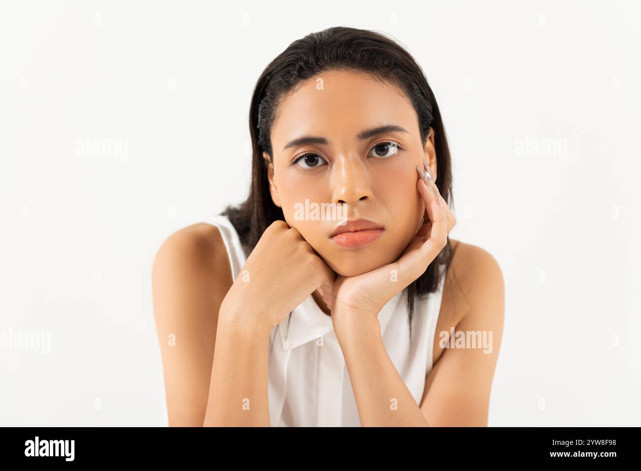 Half-woman with a melancholy look on her face Stock Photo - Alamy